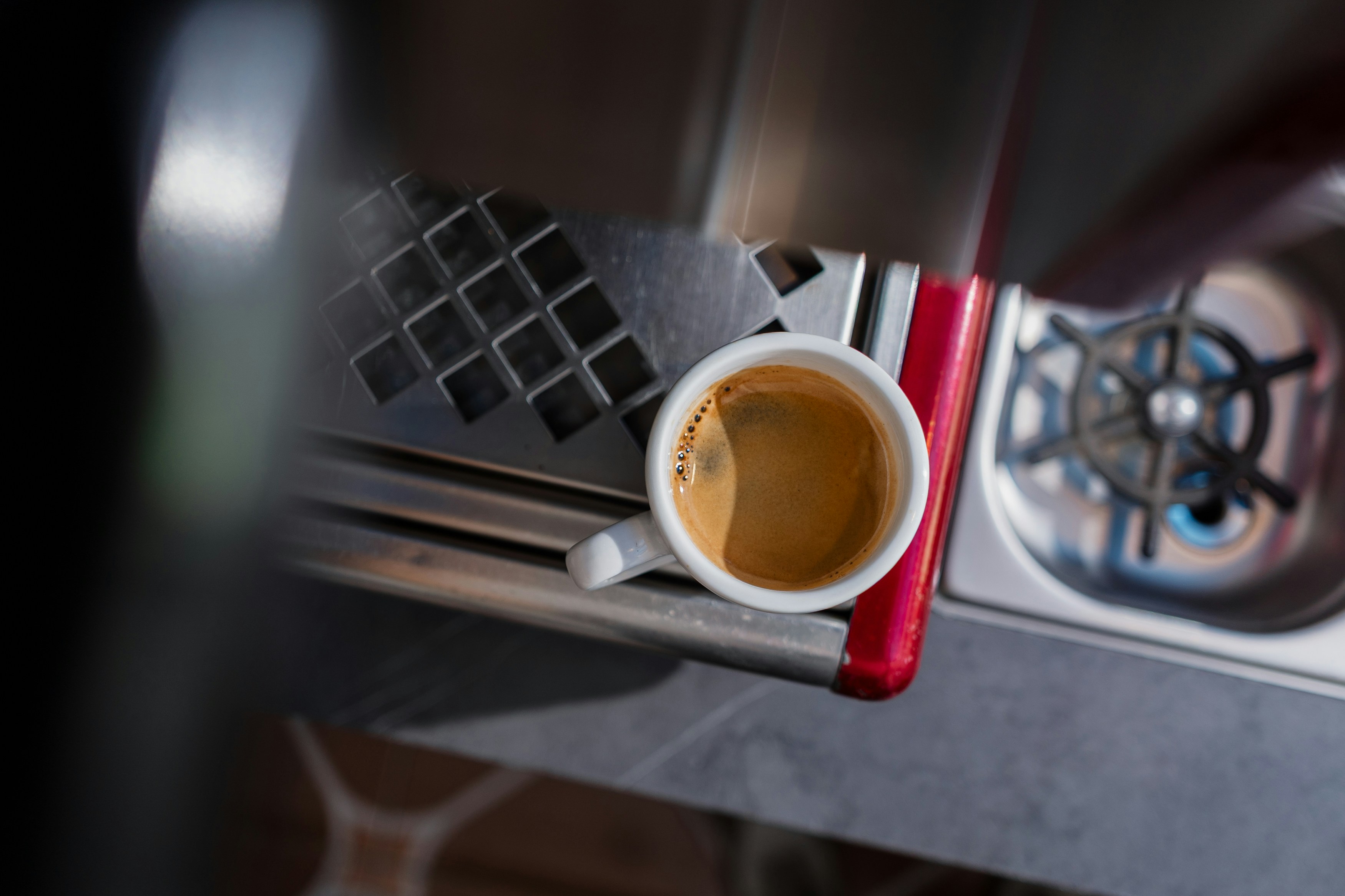 Overhead Espresso: A Quiet Moment at the Kitchen Counter