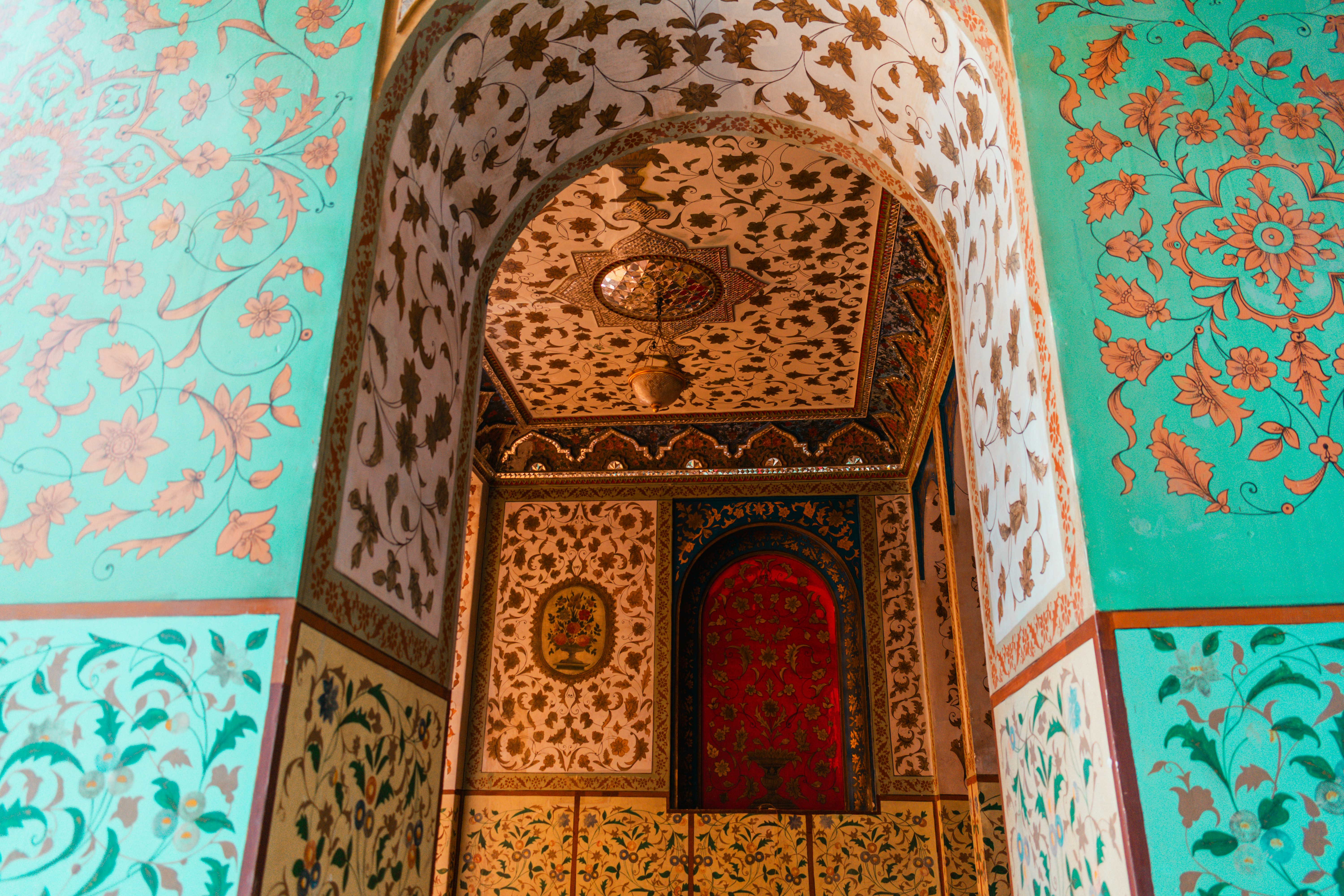 Intricate Moorish Archway: A Play of Turquoise and Gold