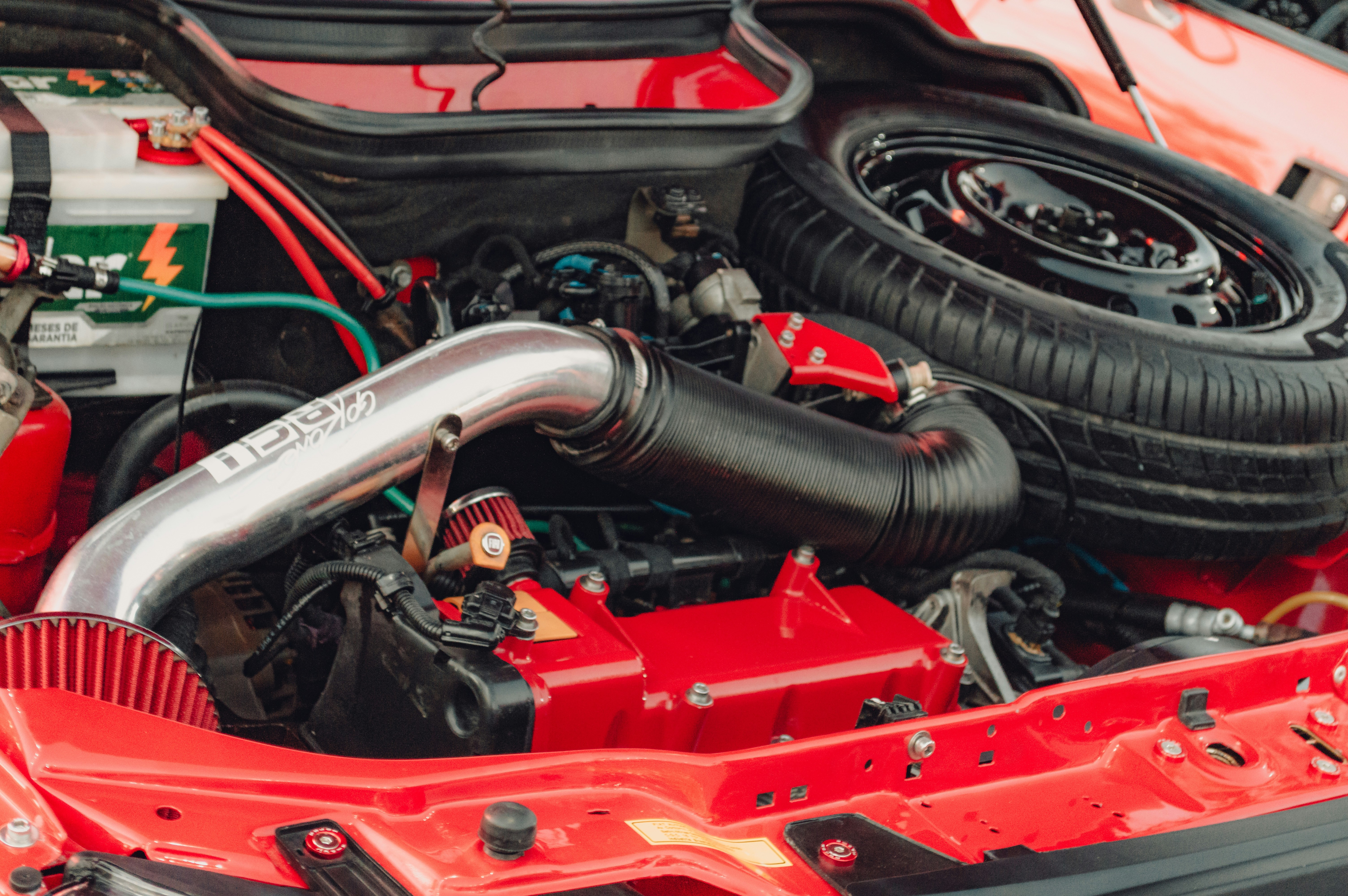 Red Heartbeat: A Vivid Car Engine under the Hood