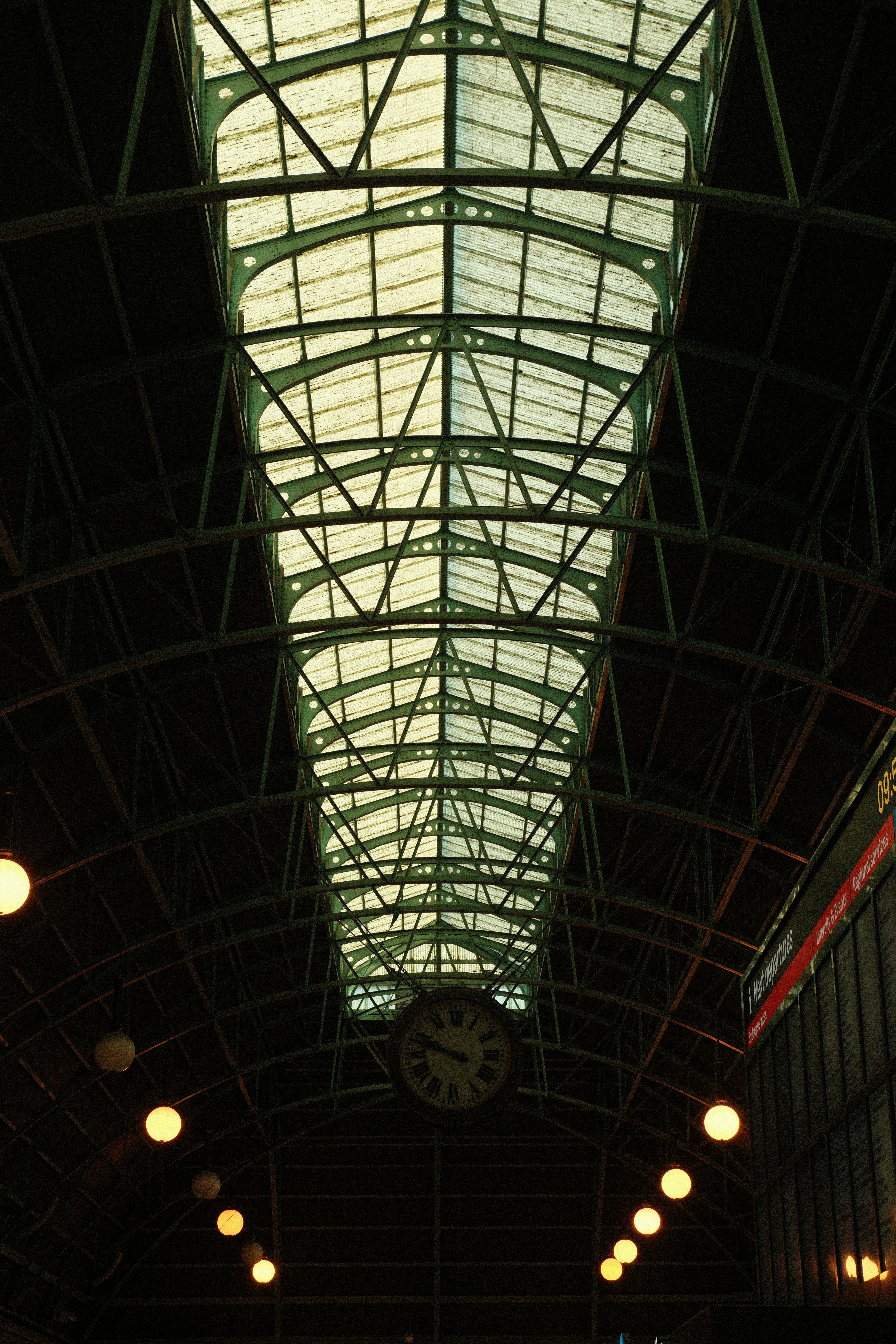 Vaulted Glass Canopy Over the Clocked Hallway