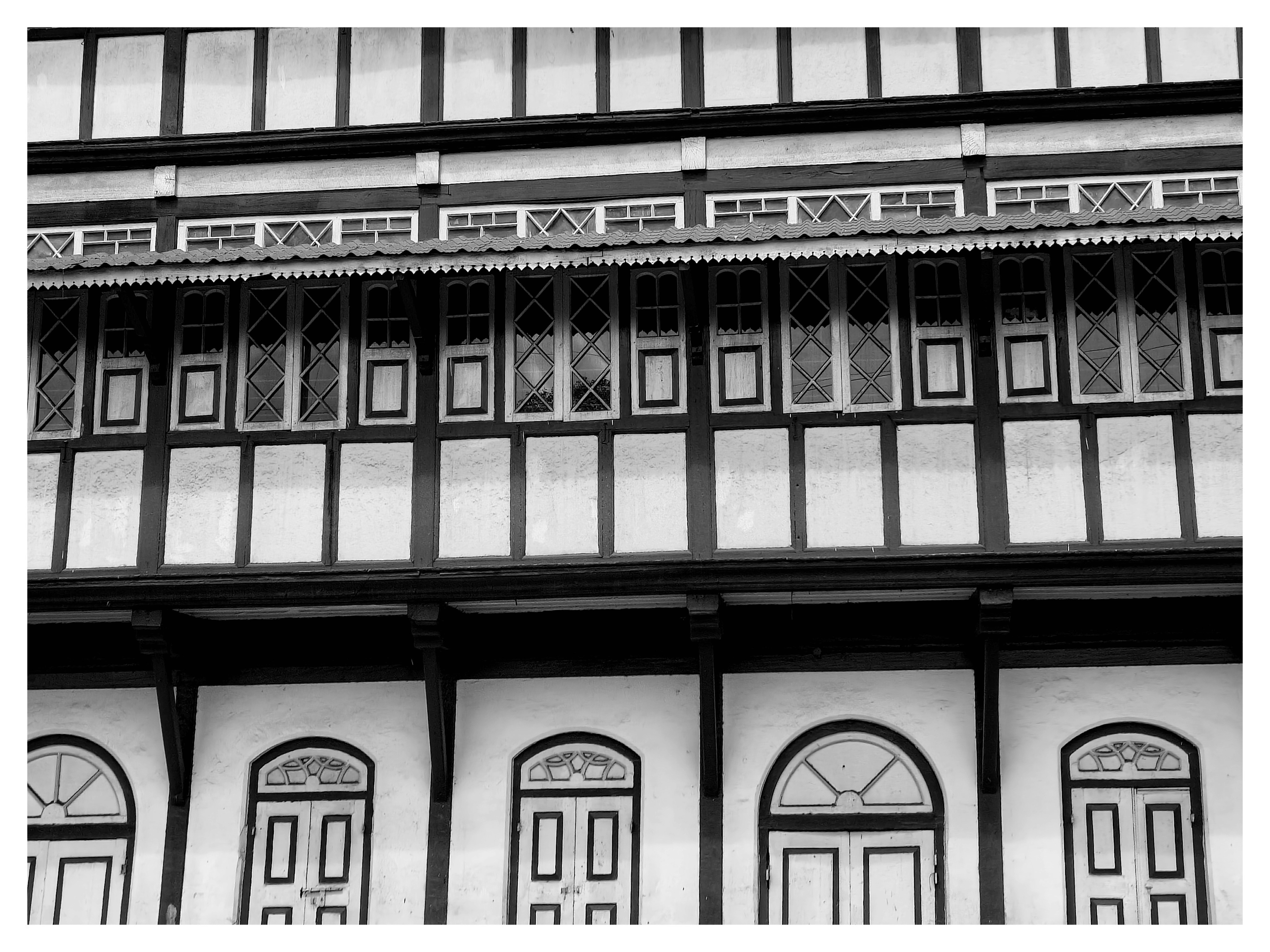 Timber-Framed Facade: Repetition in Monochrome Architecture