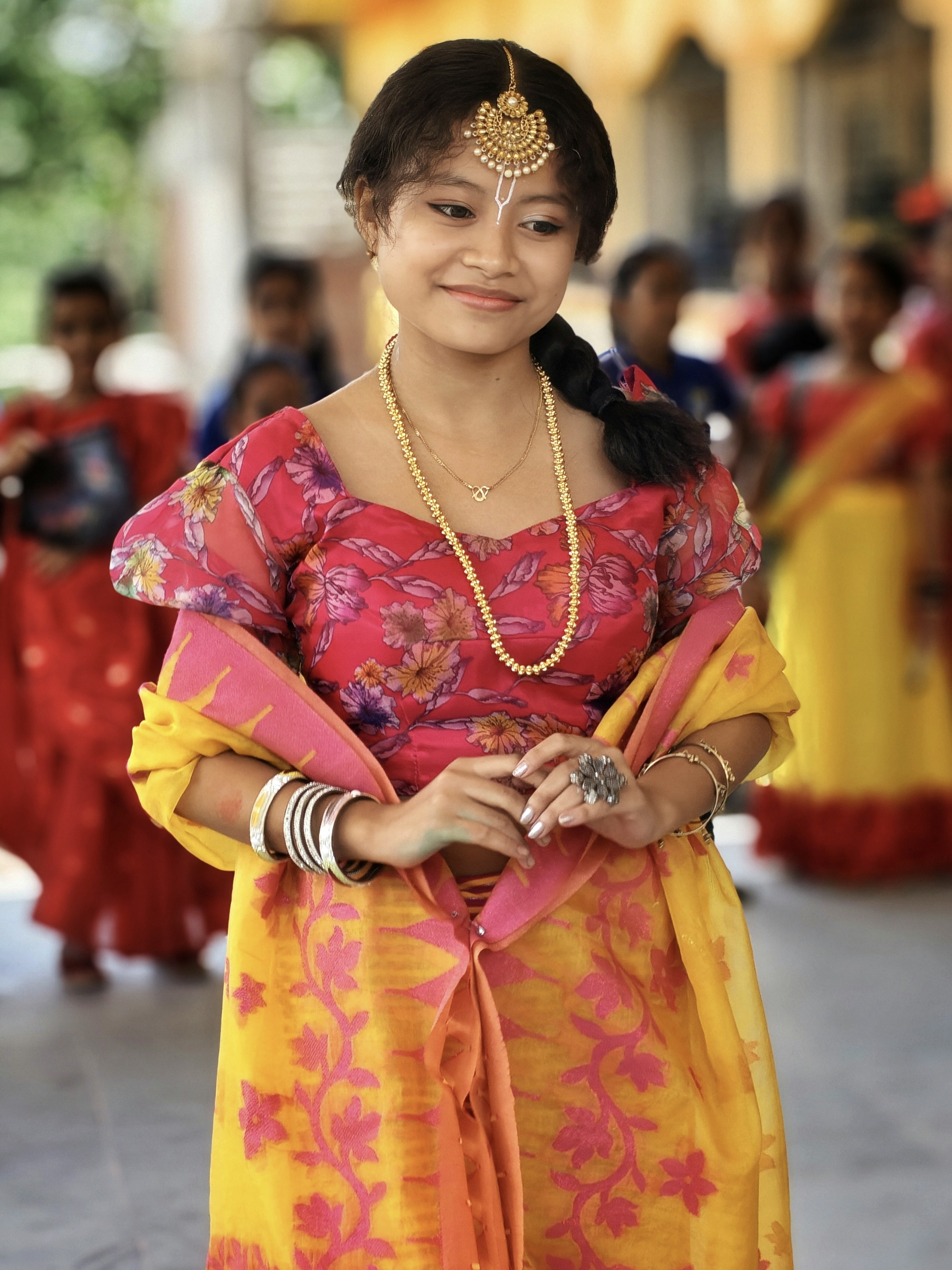 Bright Carousel of Gold: A Festive Portrait in Traditional attire