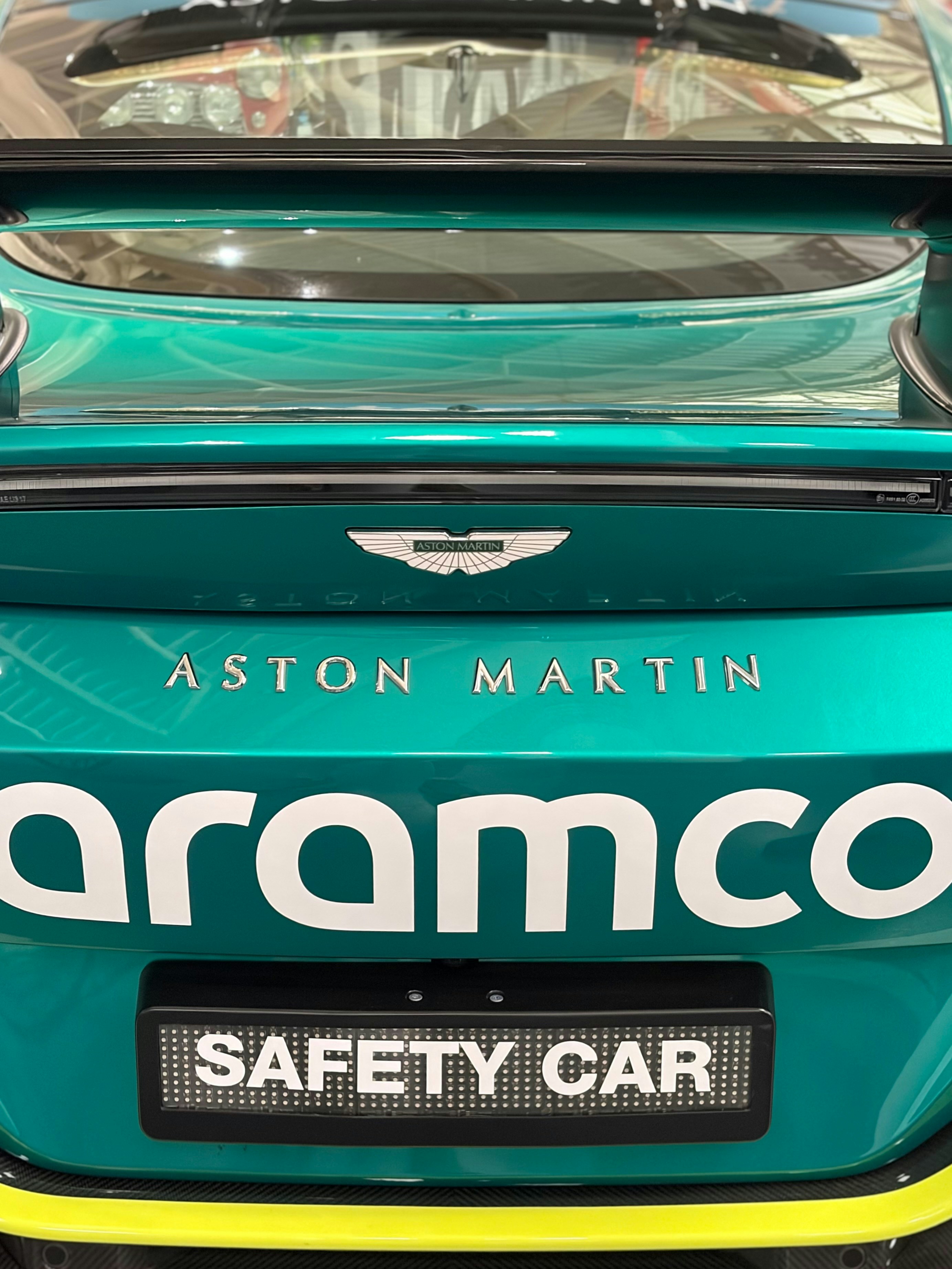 Aqua Aston: Safety Car Emblem on a Teal Aston Martin