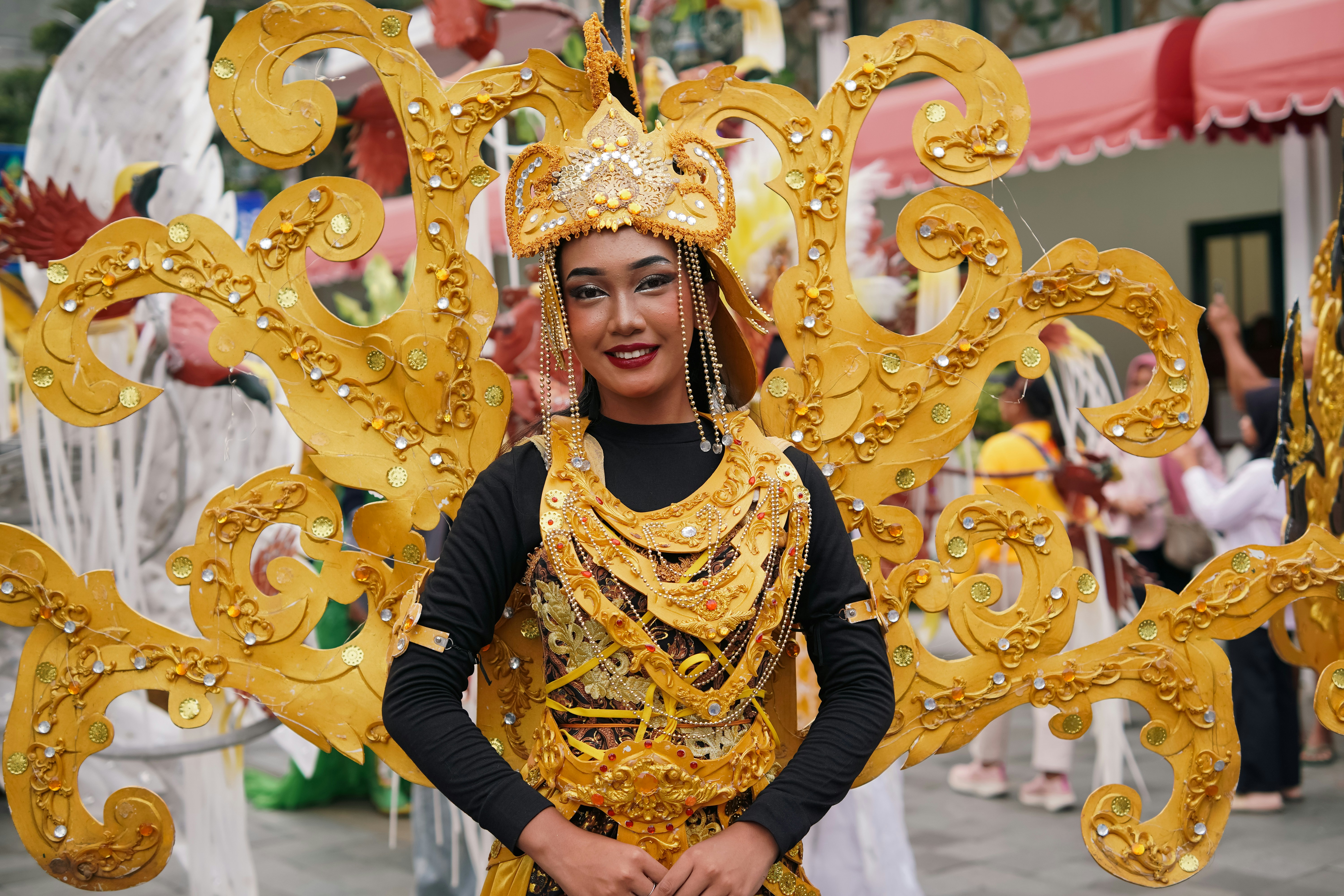 Golden Regalia: A Festival Dancer Roosted in Ornate Embellishments
