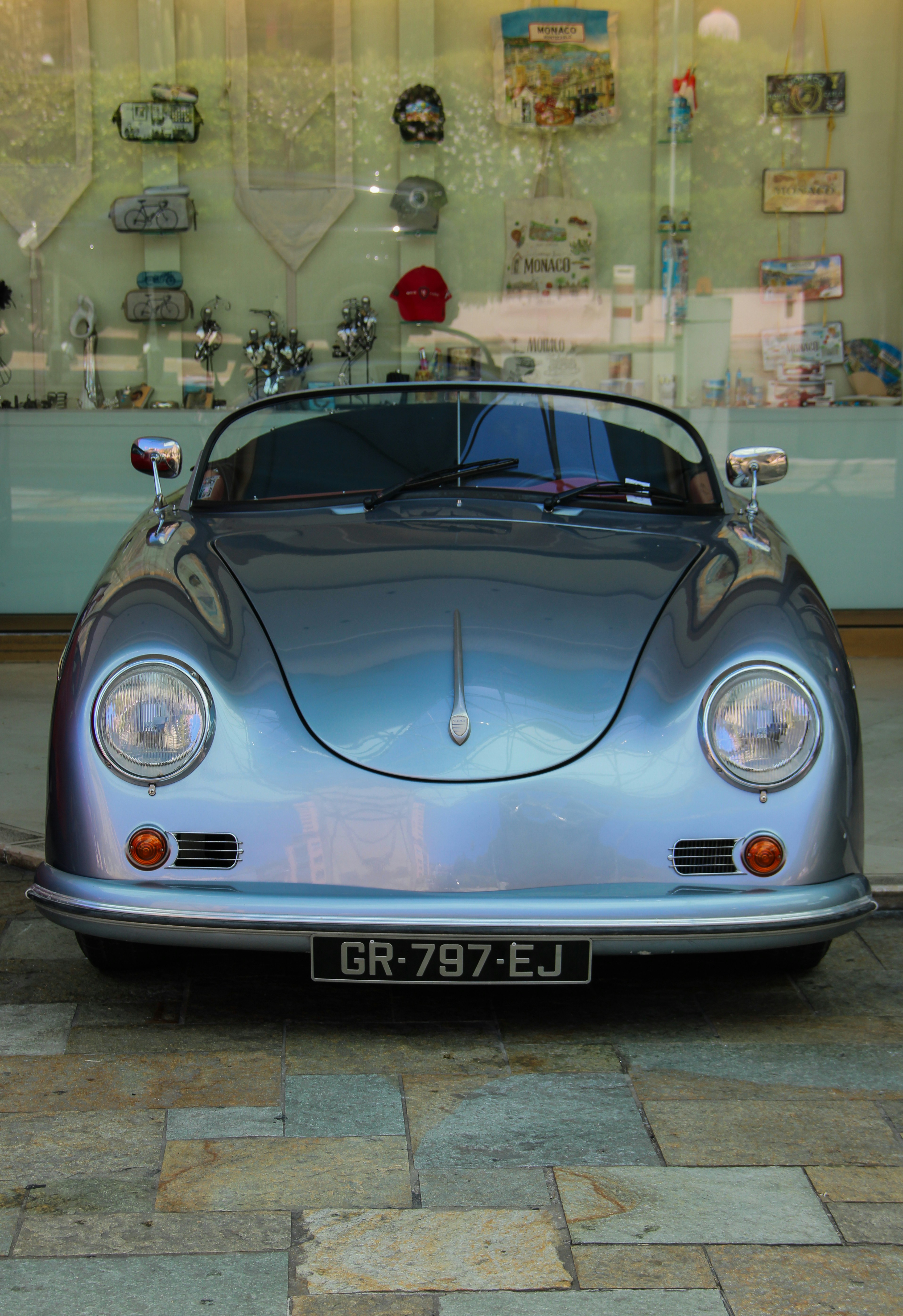 Chrome-Coated Classic: Front View of a Vintage Porsche in Soft Light