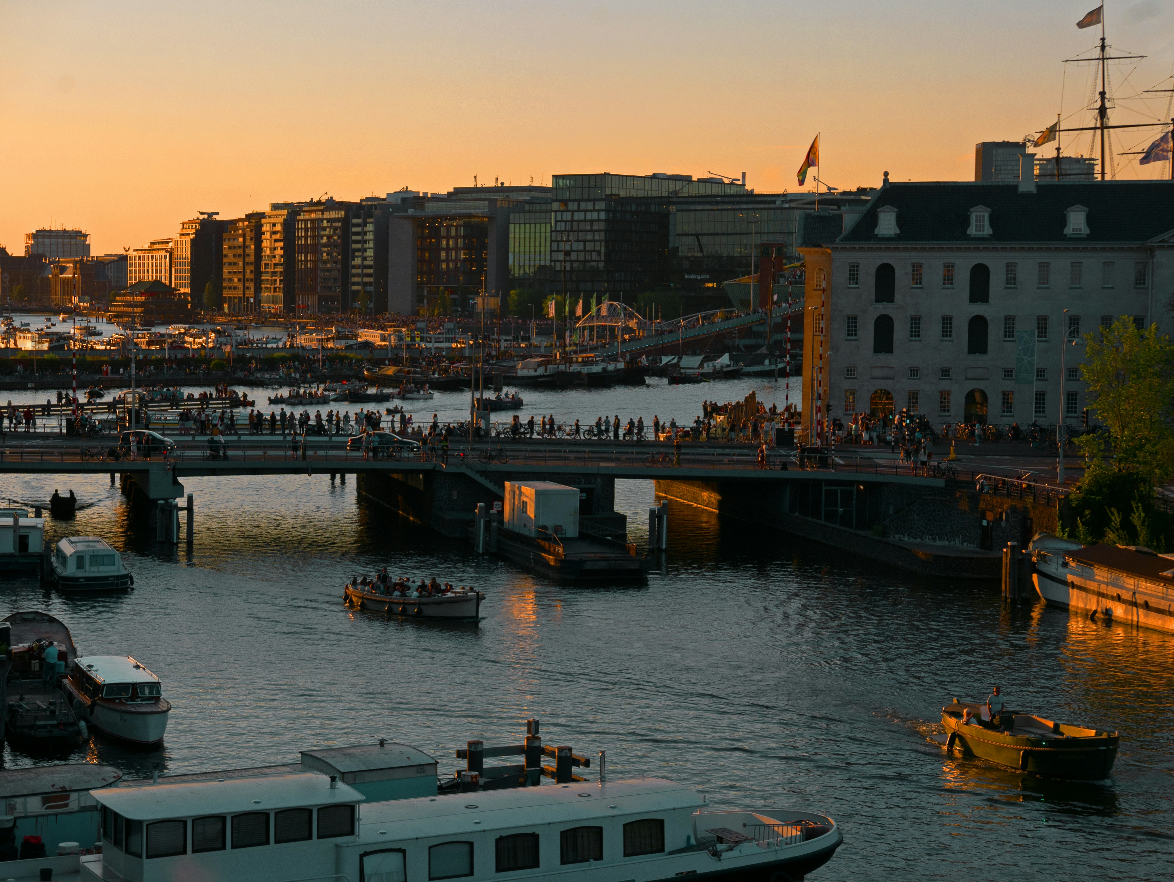Evening in the Harbor: Boats, Bridge, and City lights