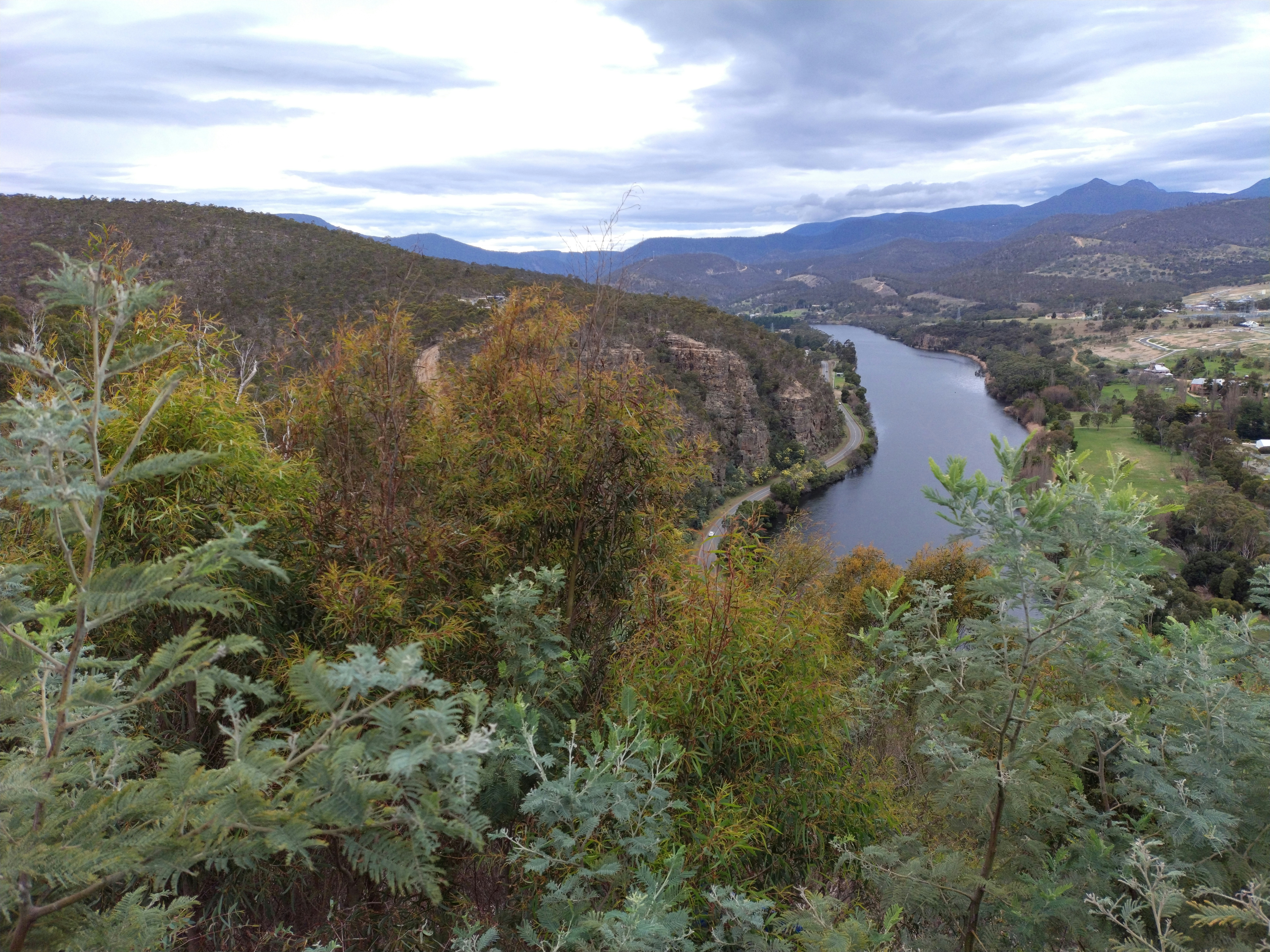 River Meanders Through Autumn Hills