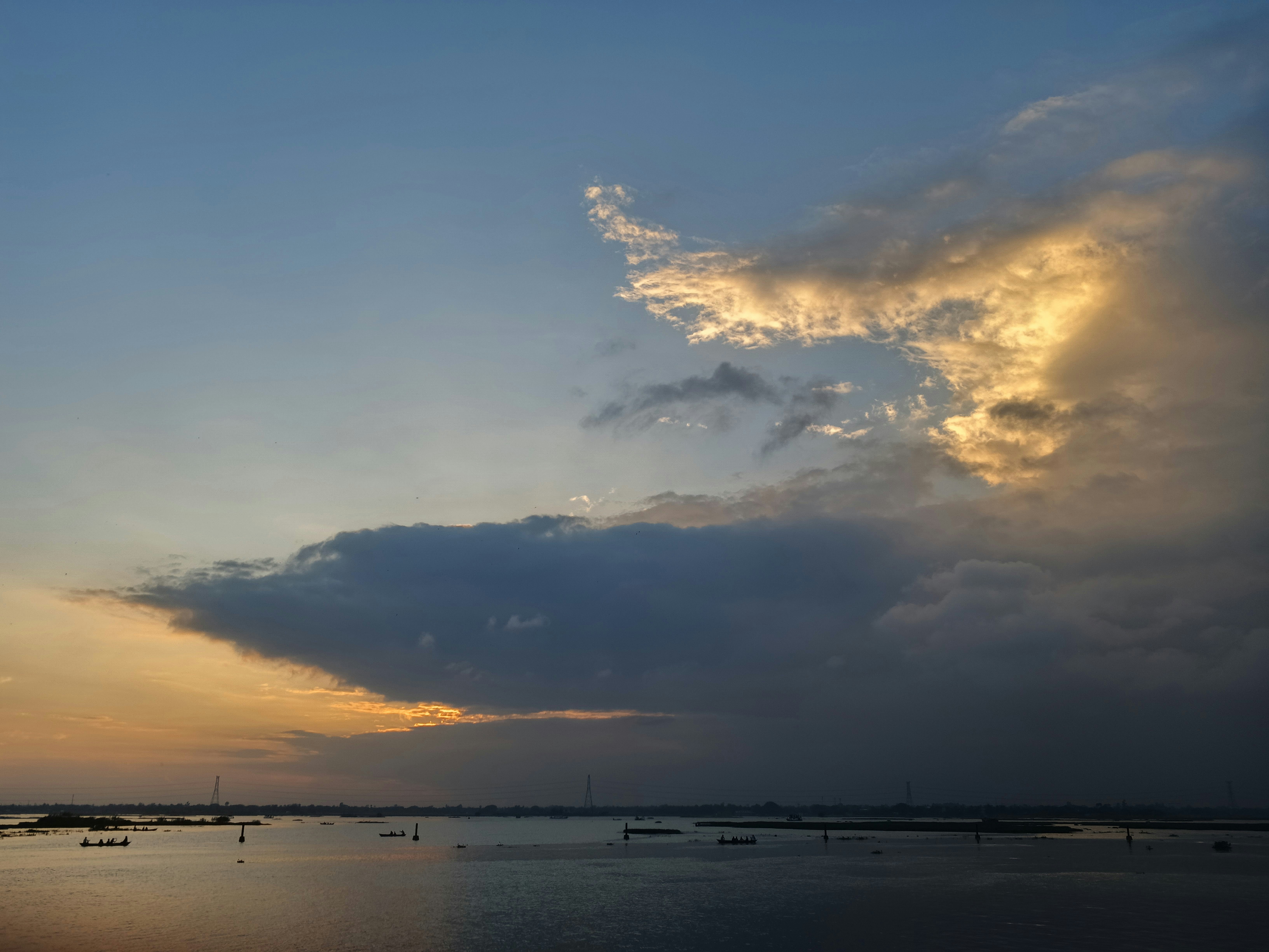 Dusk Over Quiet Waters: A Horizon Painted in Clouds