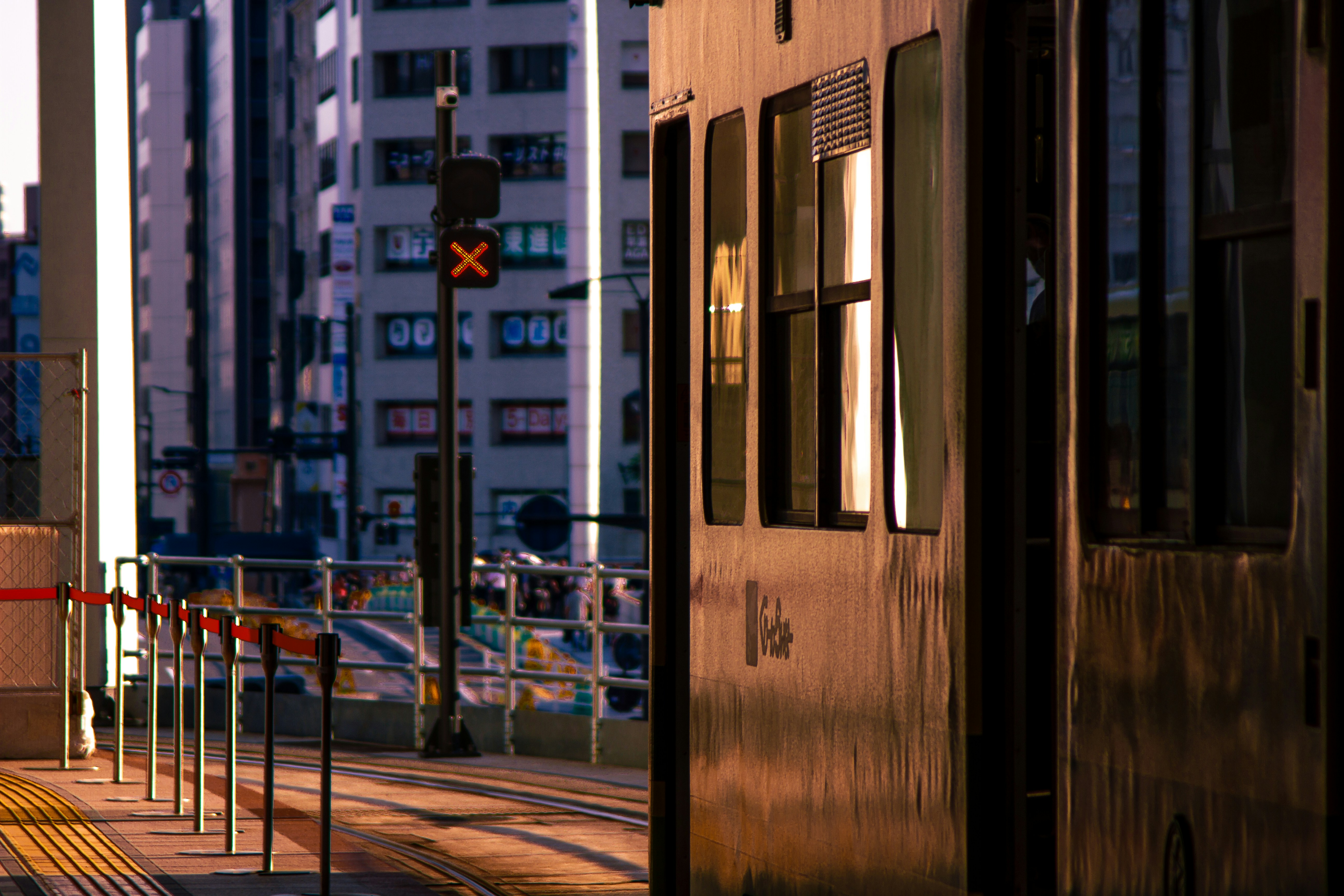 Sunlit Platform: A Quiet Moment Beside the Trains