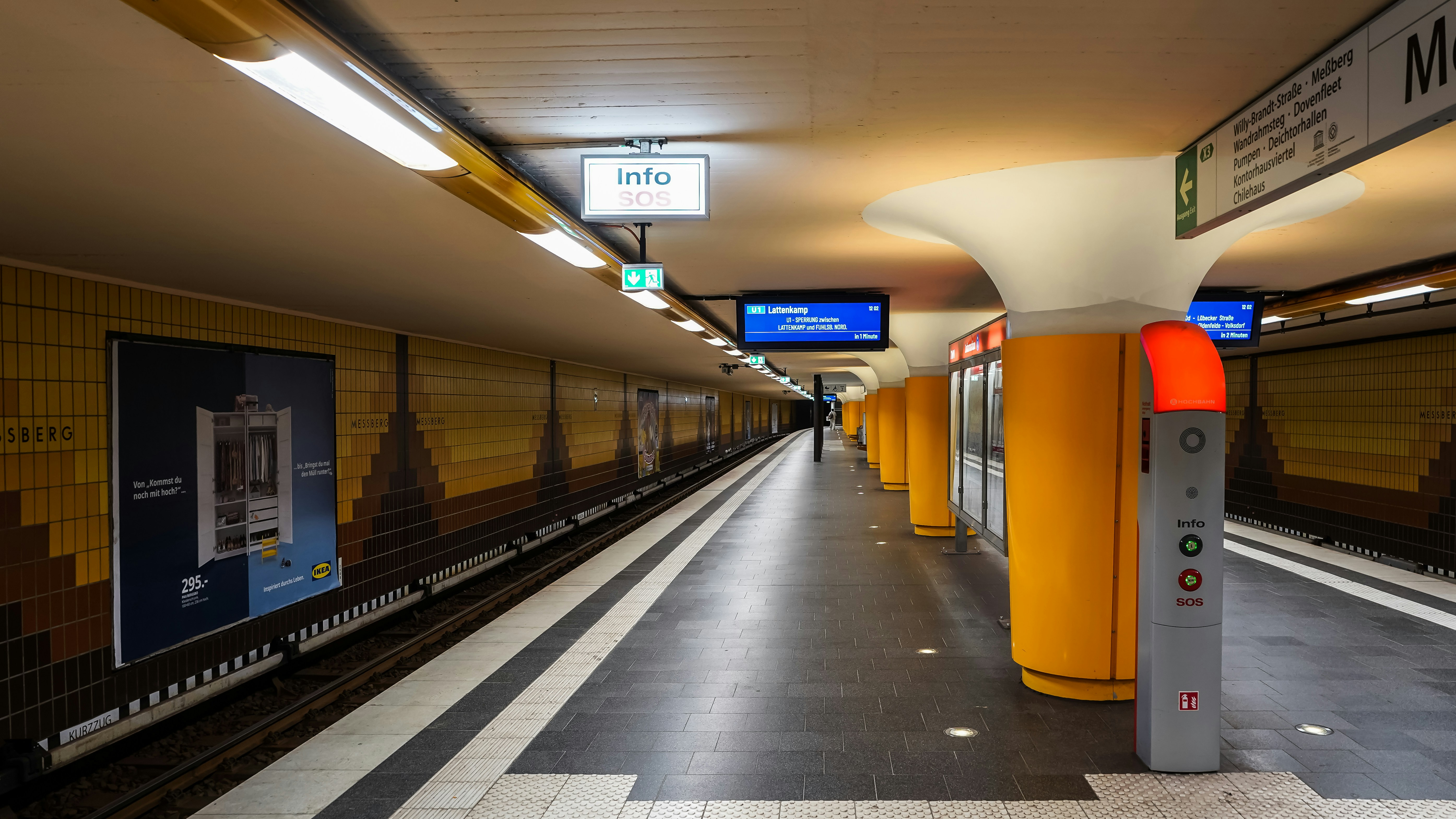 Quiet Transit Corridor: A Subway Platform Reaches the End of the Tunnel