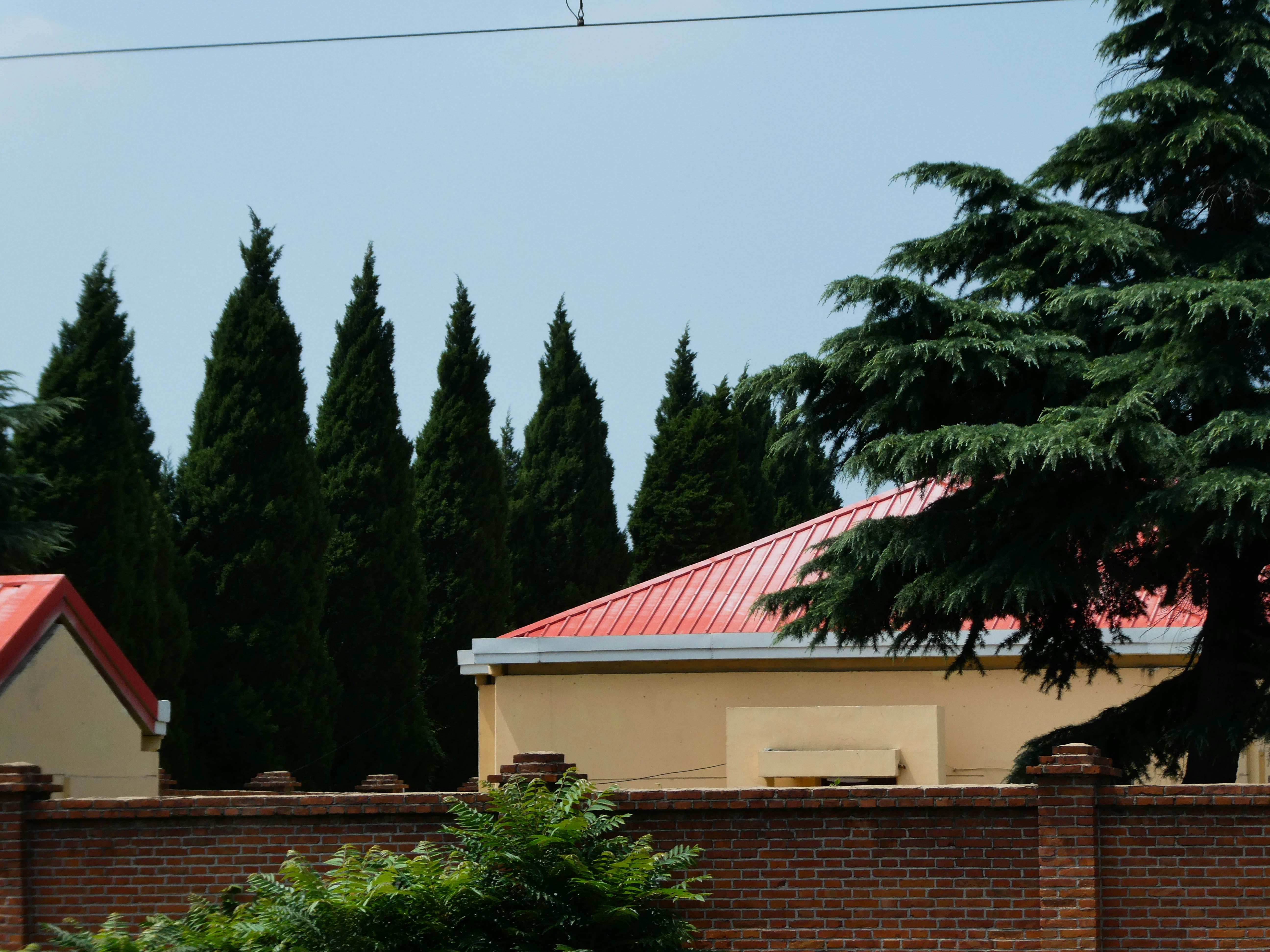 Brick Wall Horizon Under a Topped Roofline