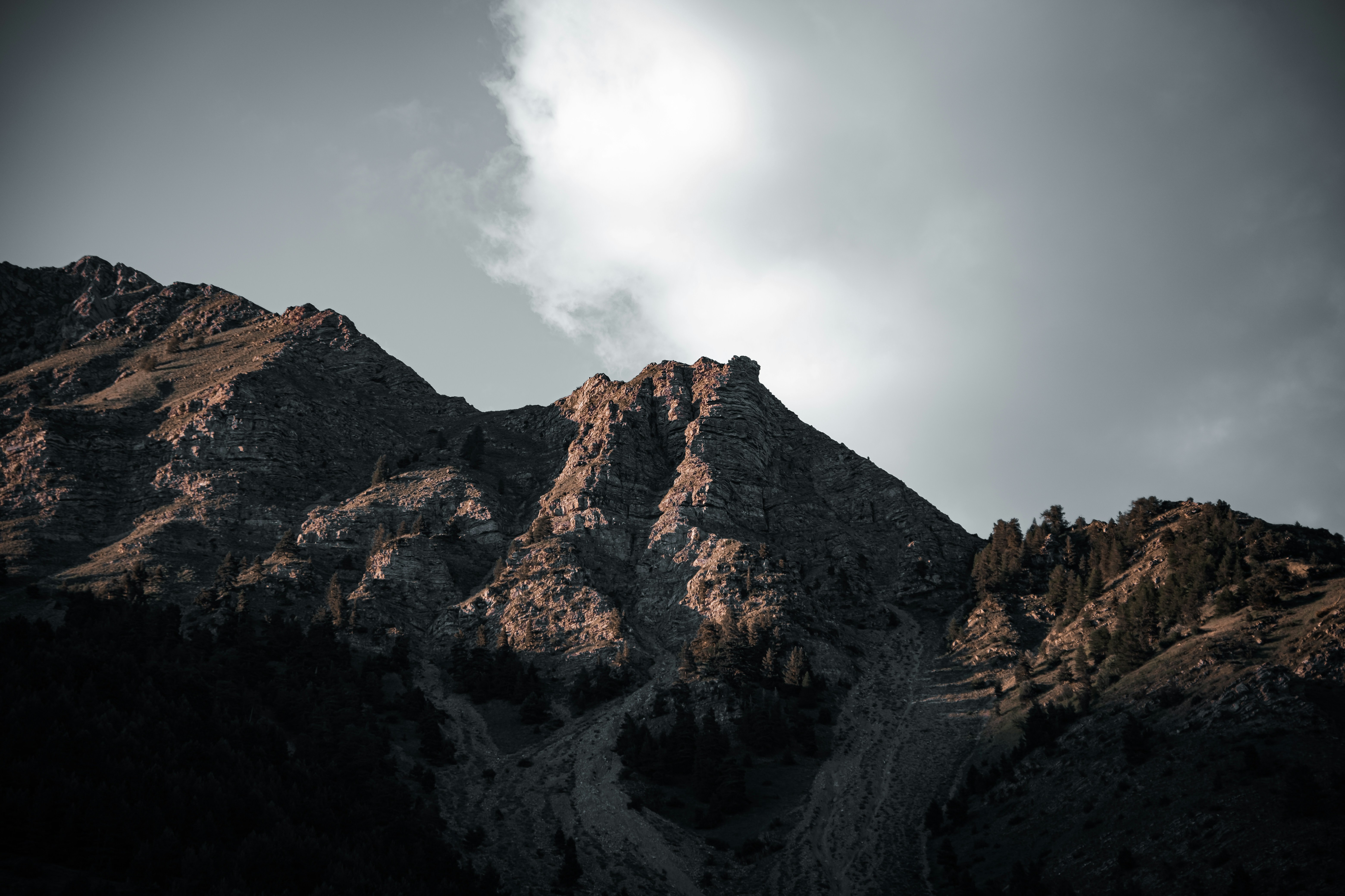 Sunlit Ridge: A Quiet Clash of Light and Stone