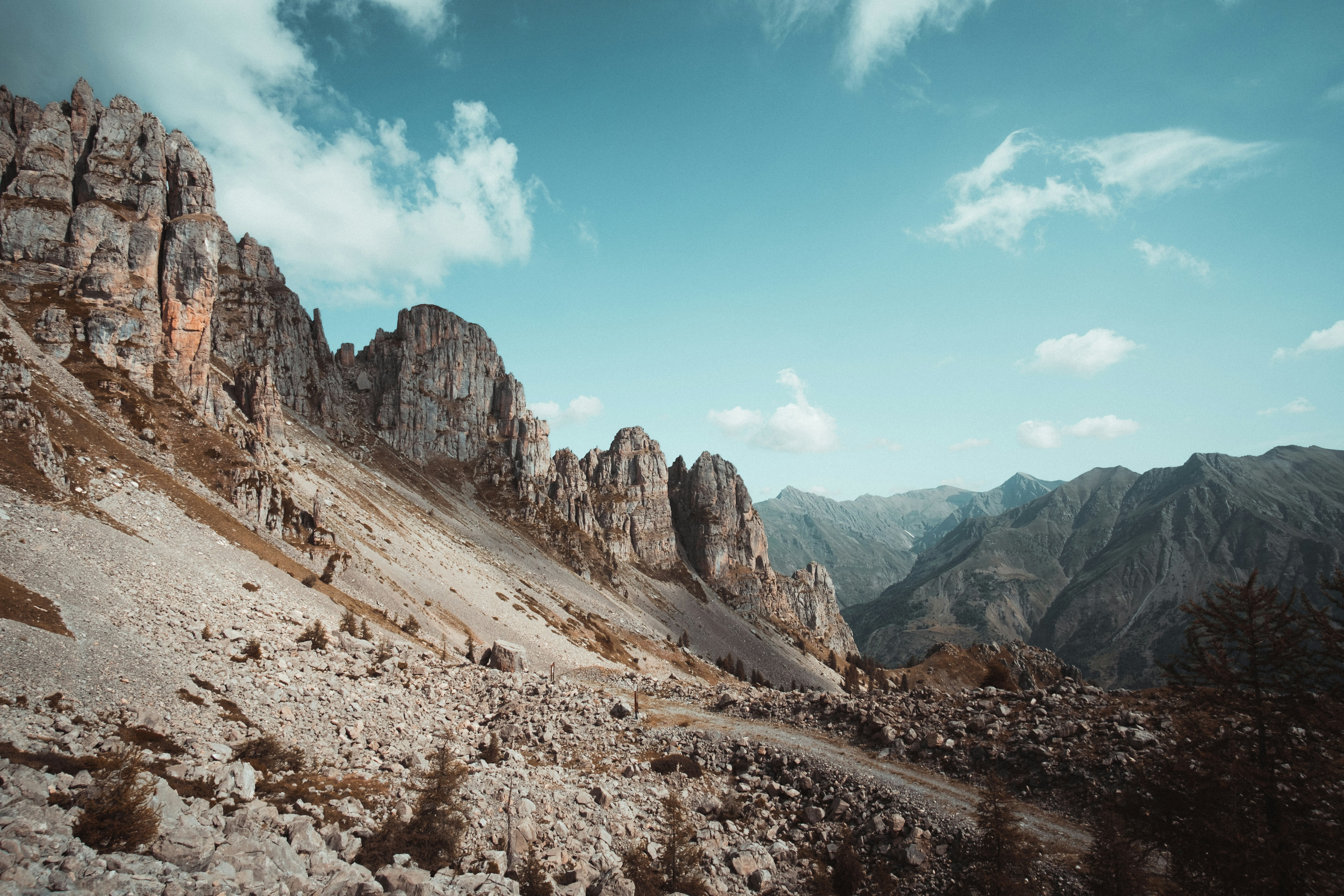 Rugged Rim: A Sunlit Pass Through Jagged Peaks