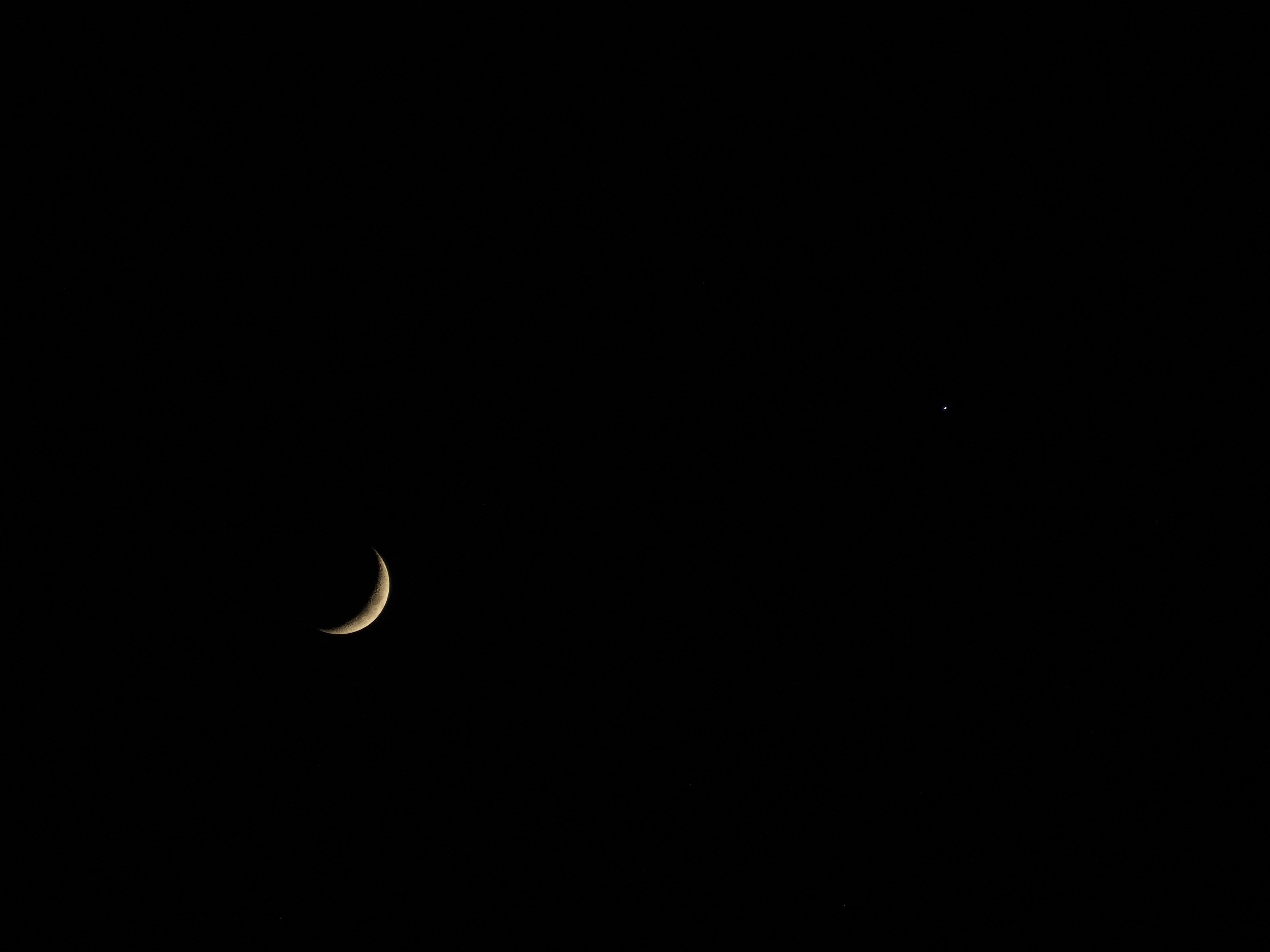 Lone Crescent Over Quiet Skies