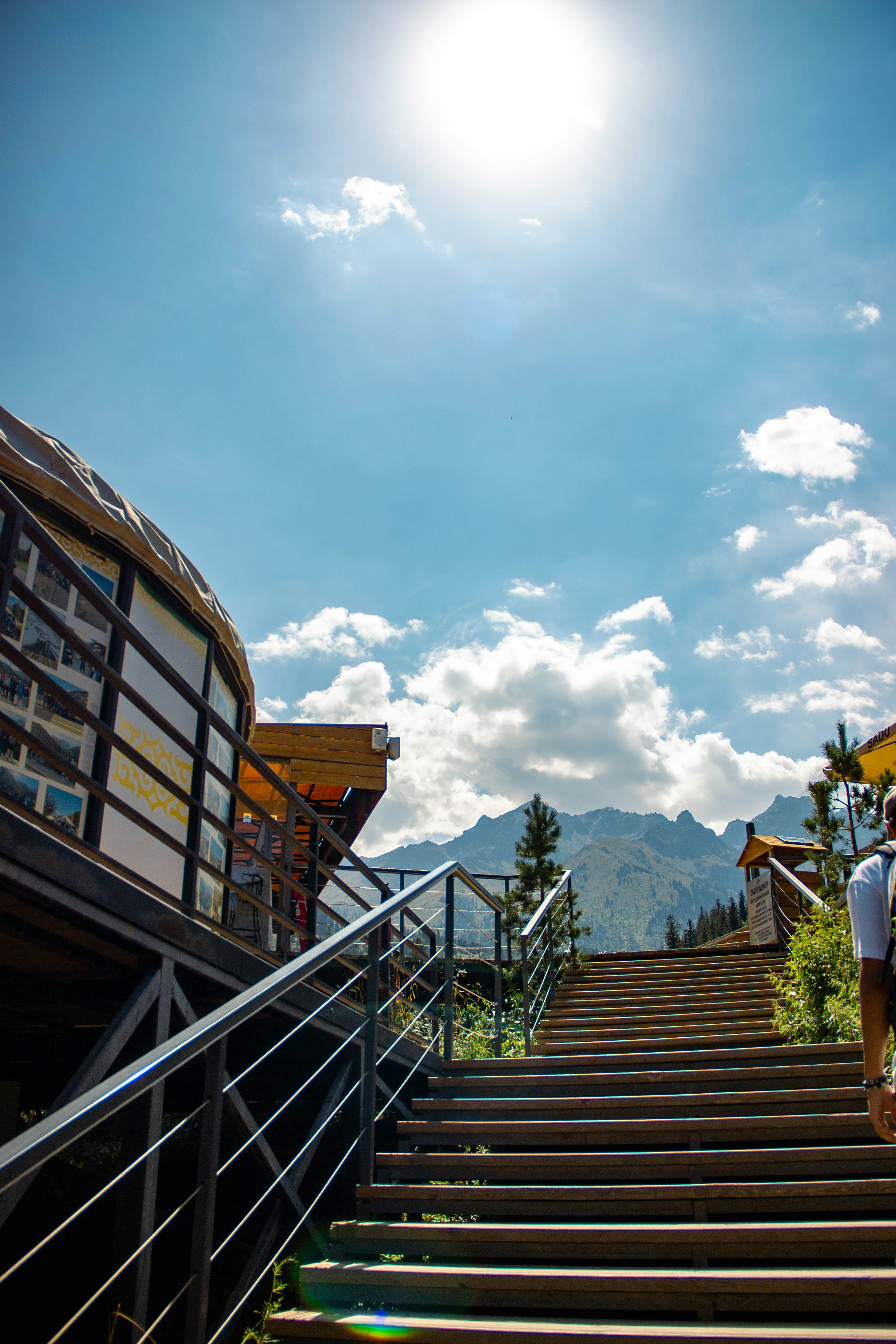 Ascending toward the Sky: A Mountain Staircase toward a Bright Horizon