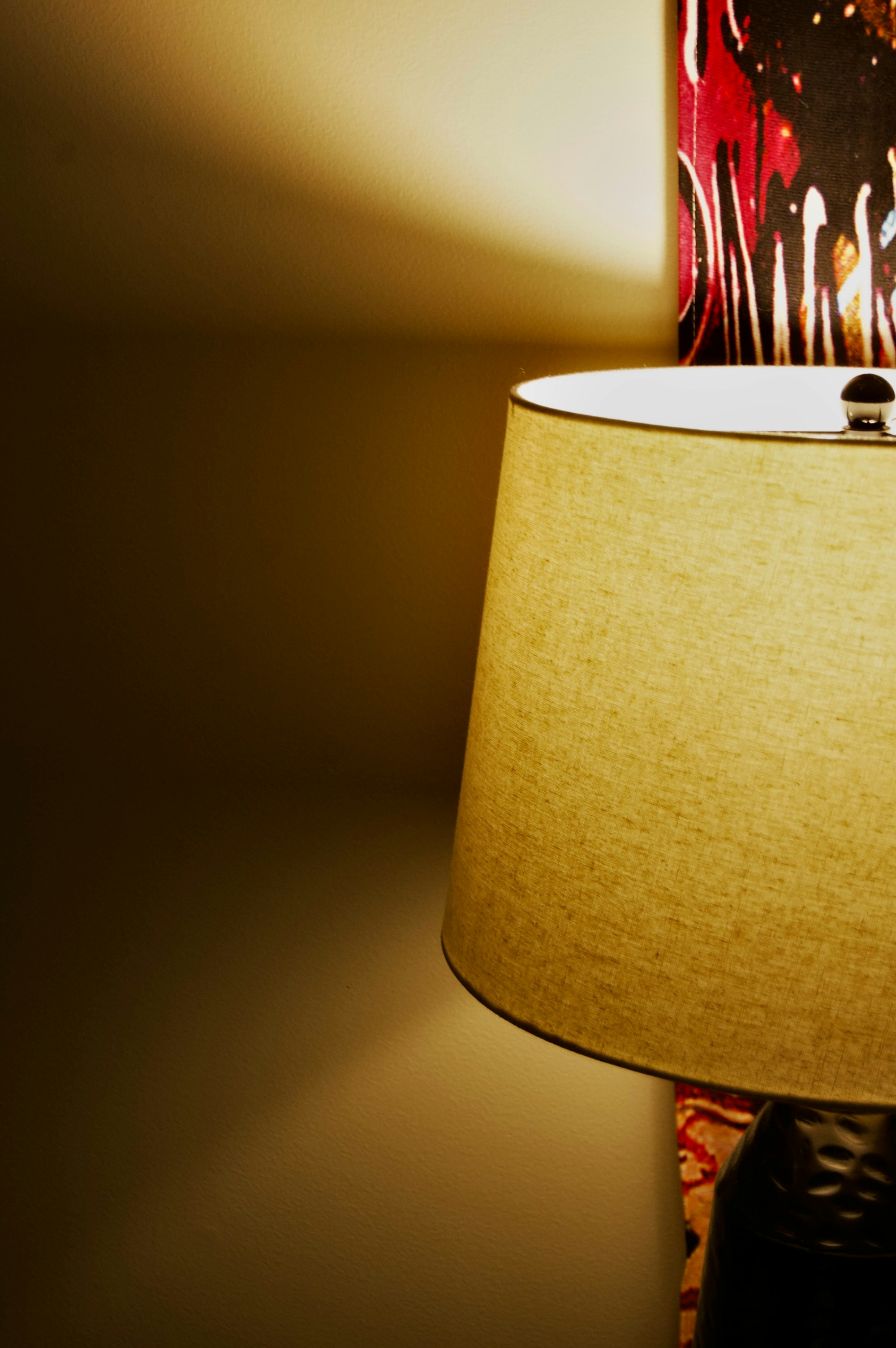 Lampshade in a Quiet Corner: Warm Ambiance and Abstract Backdrop