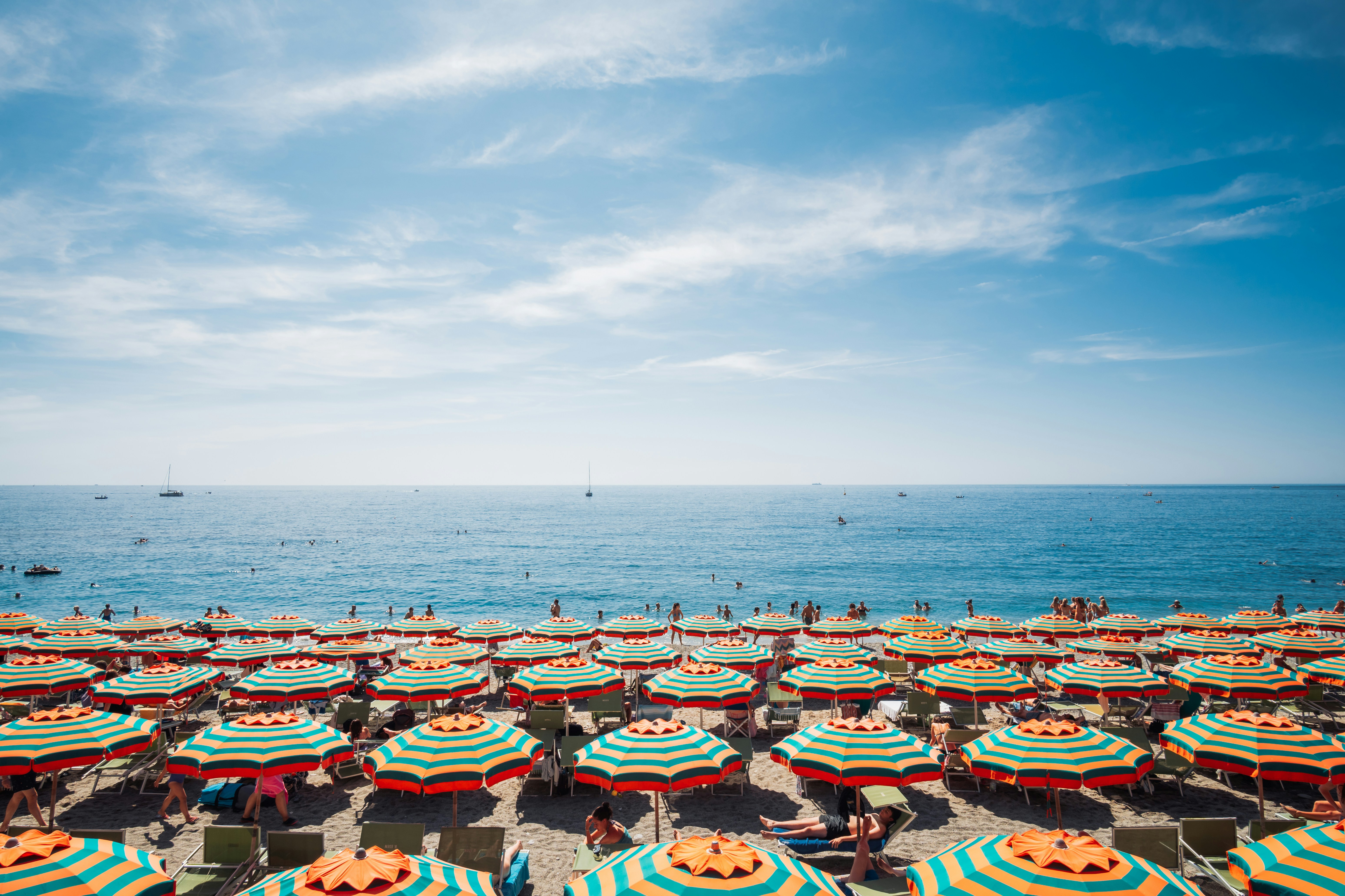 Tiled Coastal Mirage: A Sea of Striped Beach Umbrellas