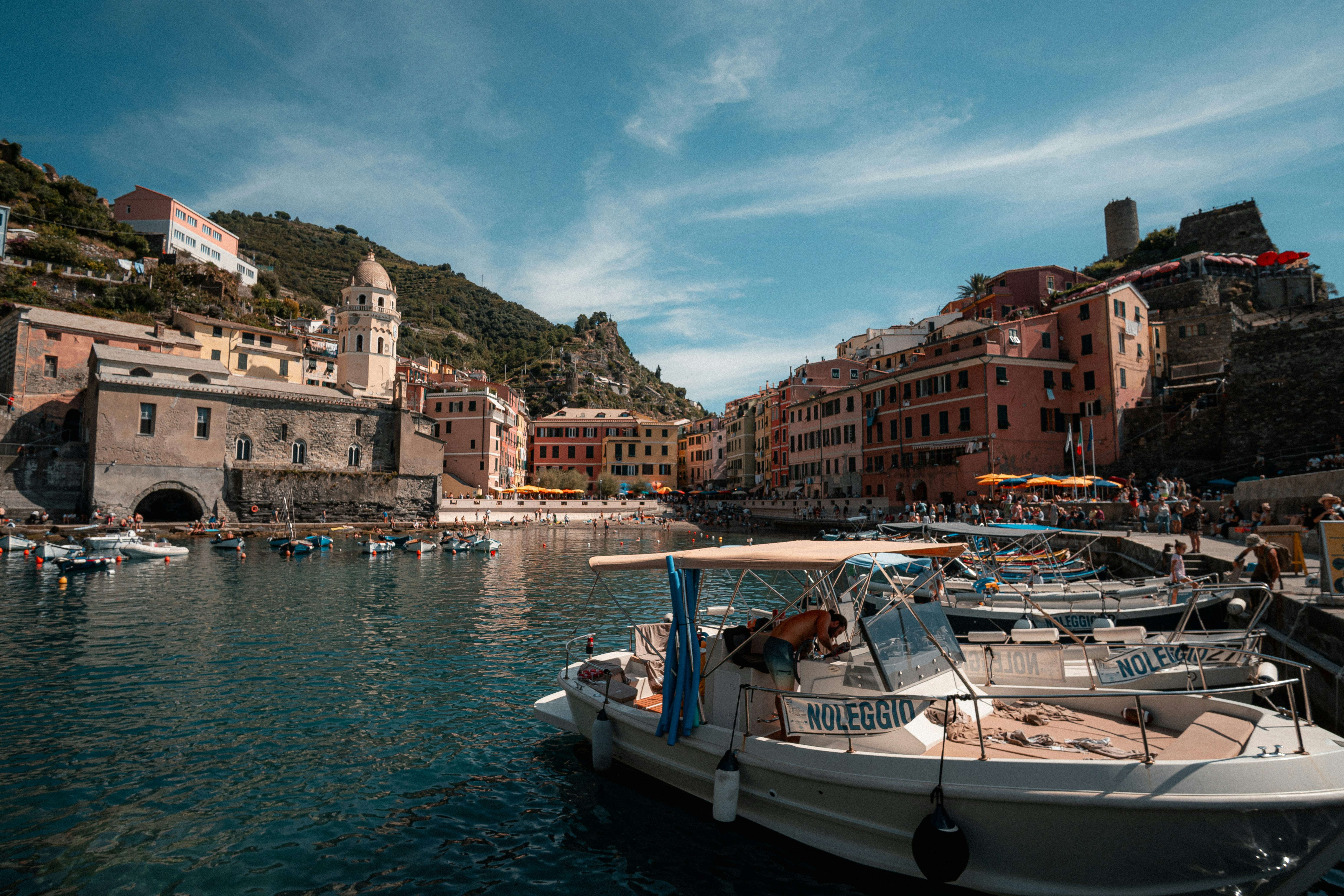 Harbor avenues of pastel villas under Mediterranean light