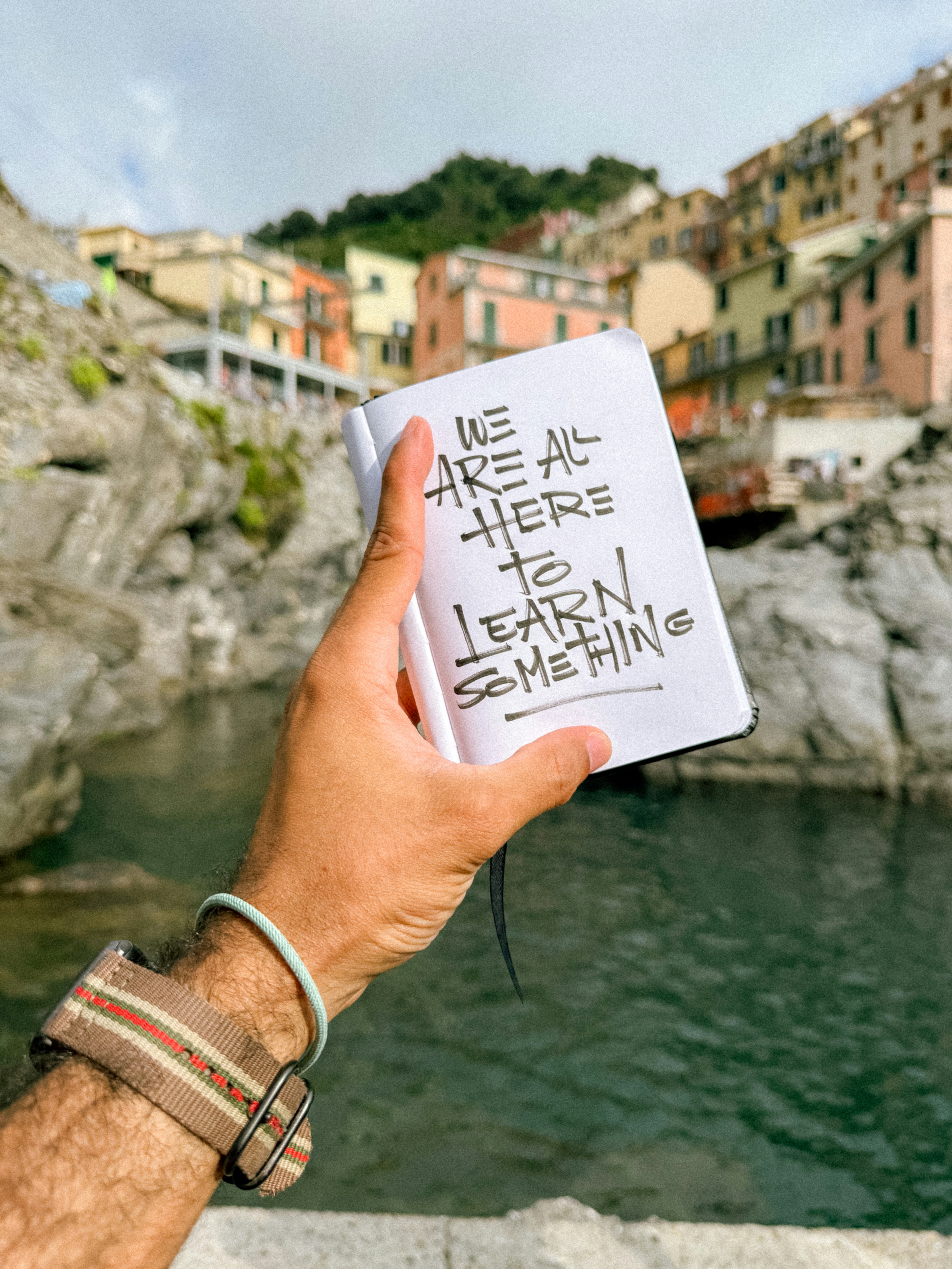 Handheld Notebook of Learning by the Waterfront