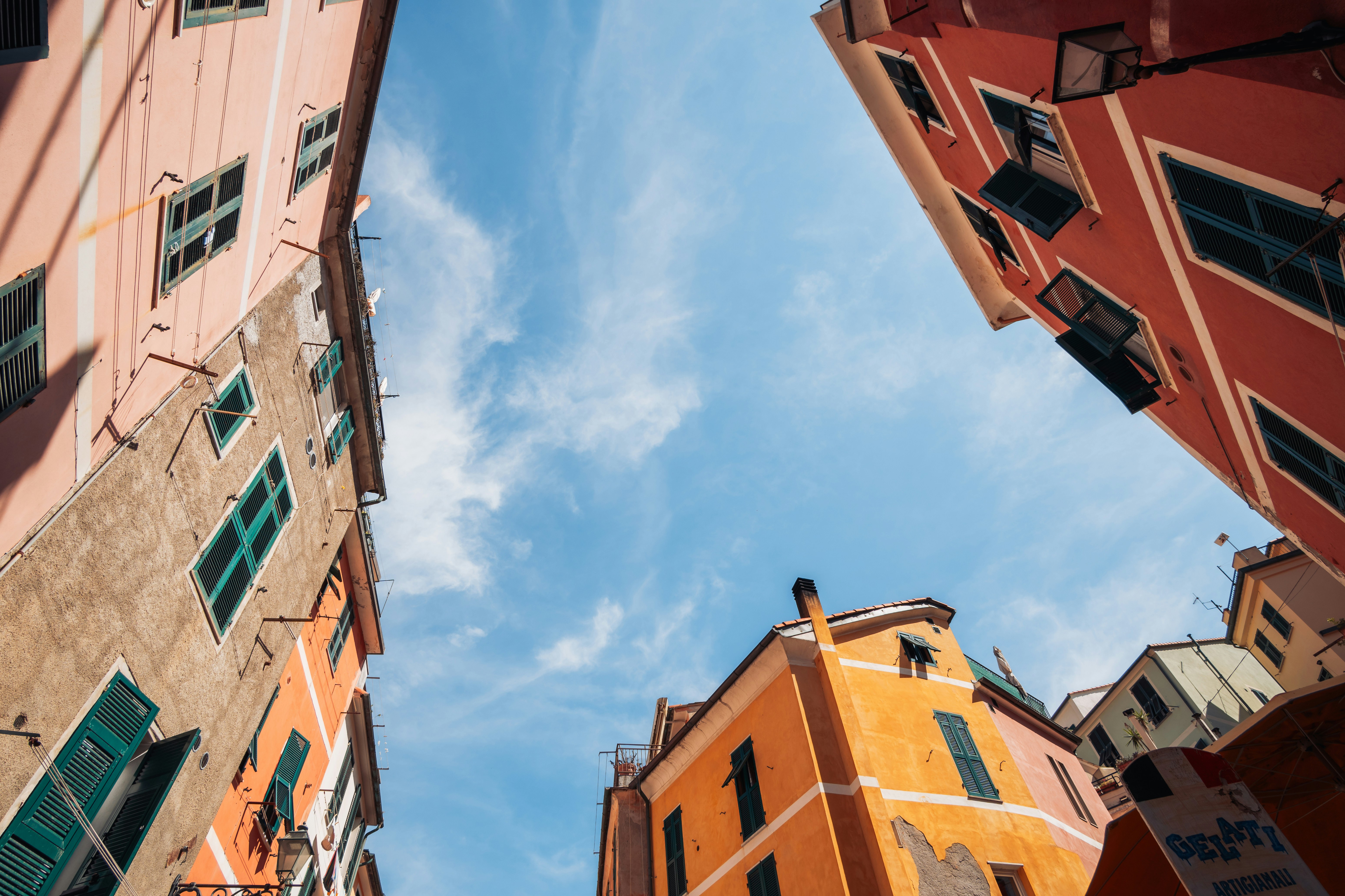 Skyward Color: A Street Corner Converges Toward the Blue