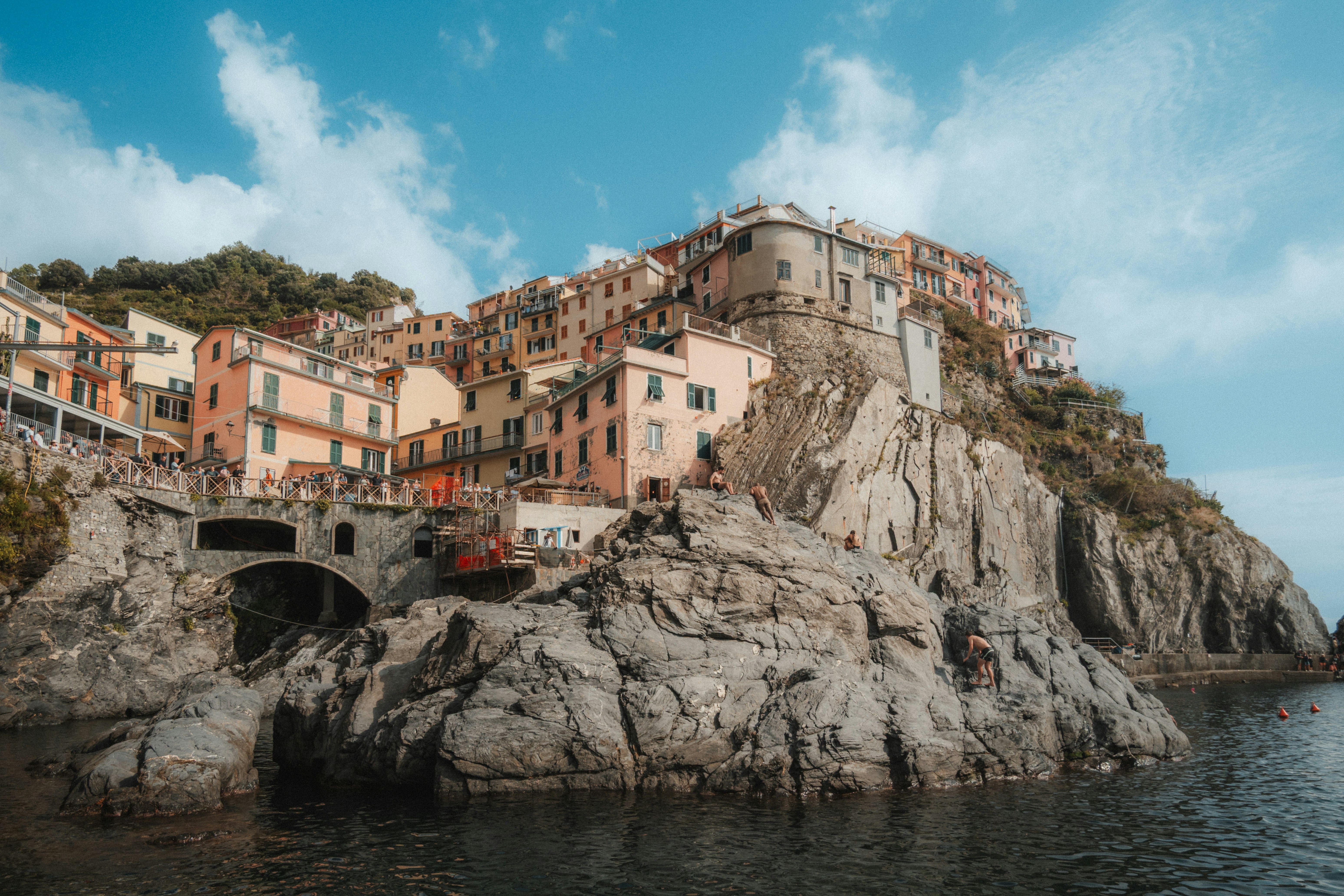 Colorful Cliffside Village Rising from Calming Adriatic