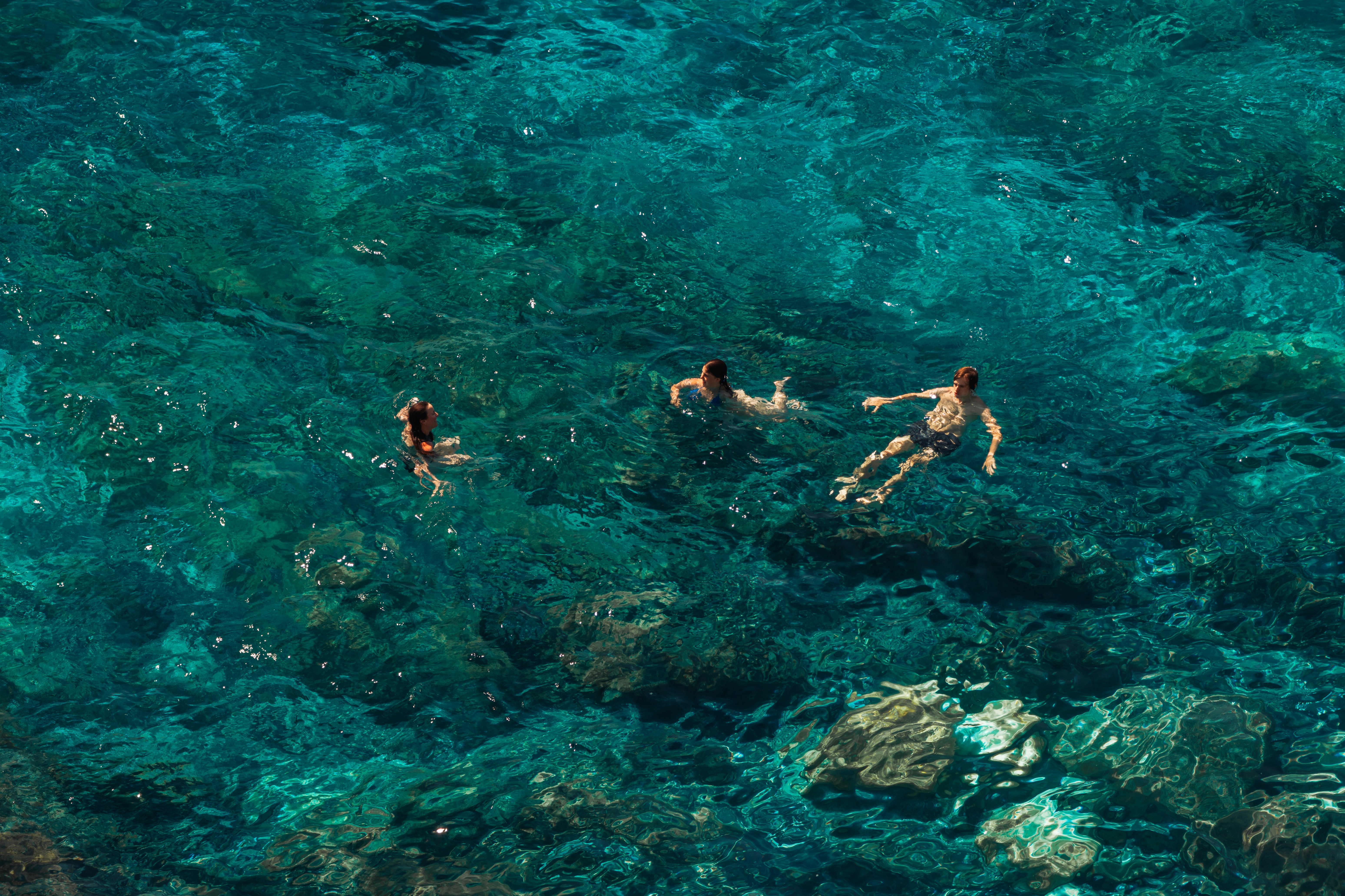 Teal Waters: Aerial Swim Through Hidden Reef Blues