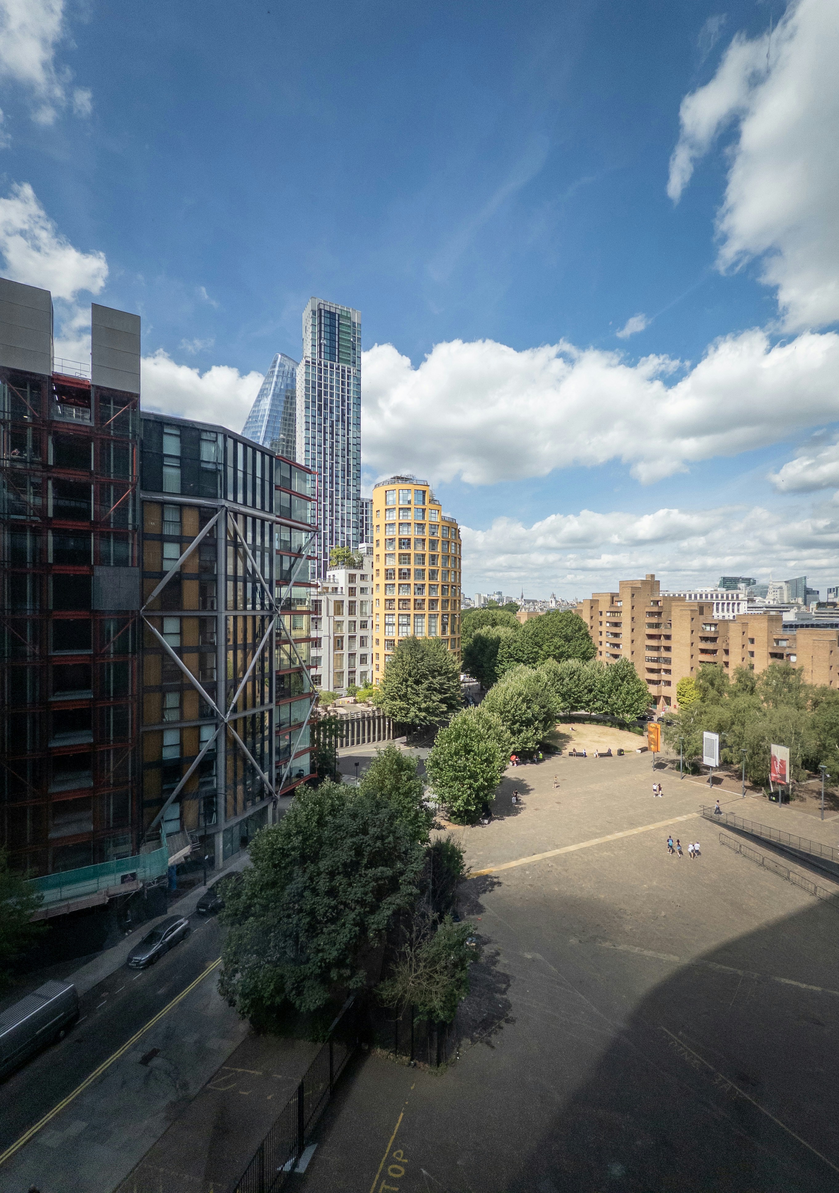 Skyline Corridor: A Street-Level View Toward Urban Giants