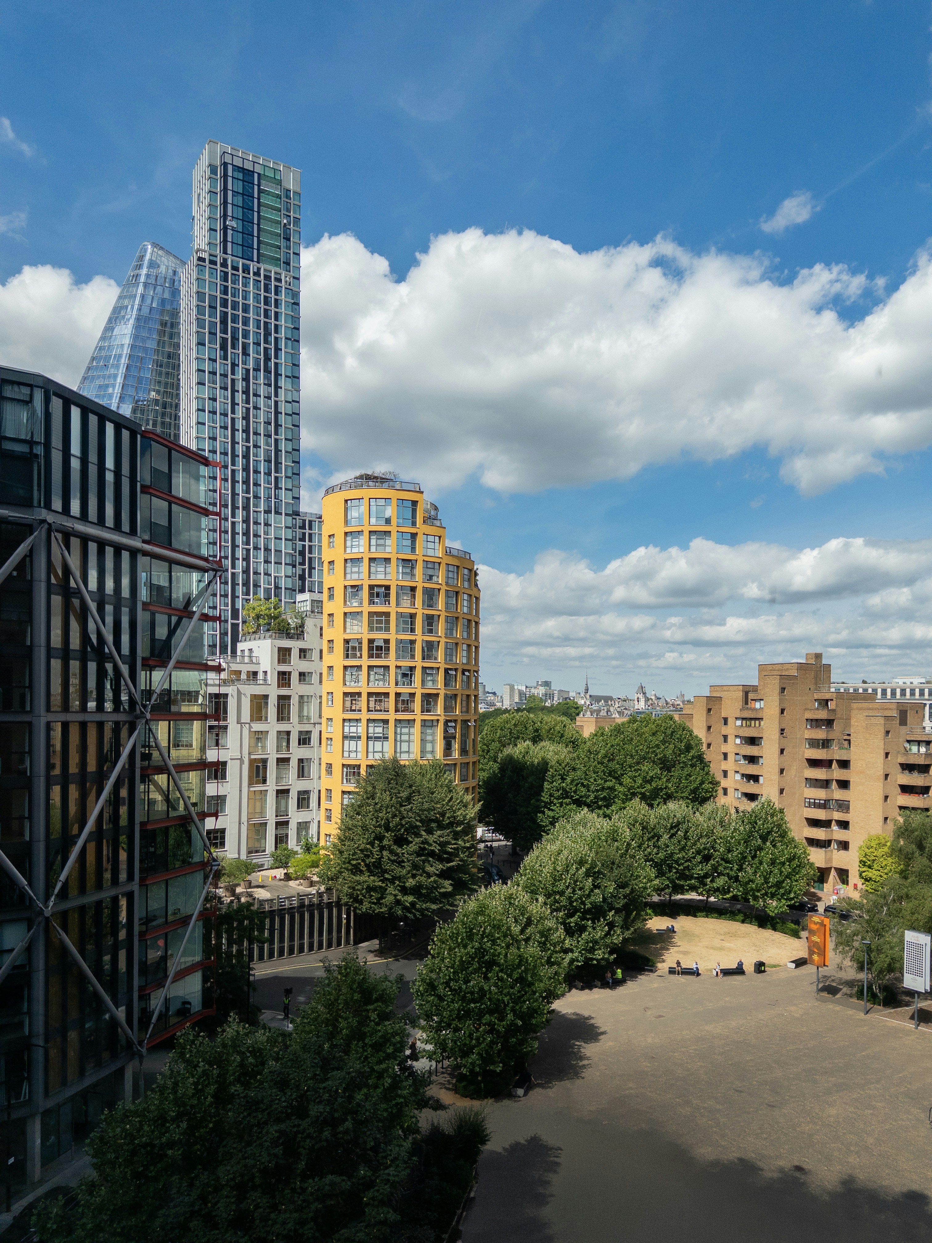 Civic Vista: Urban Towers Reaching Toward a Clouded Sky