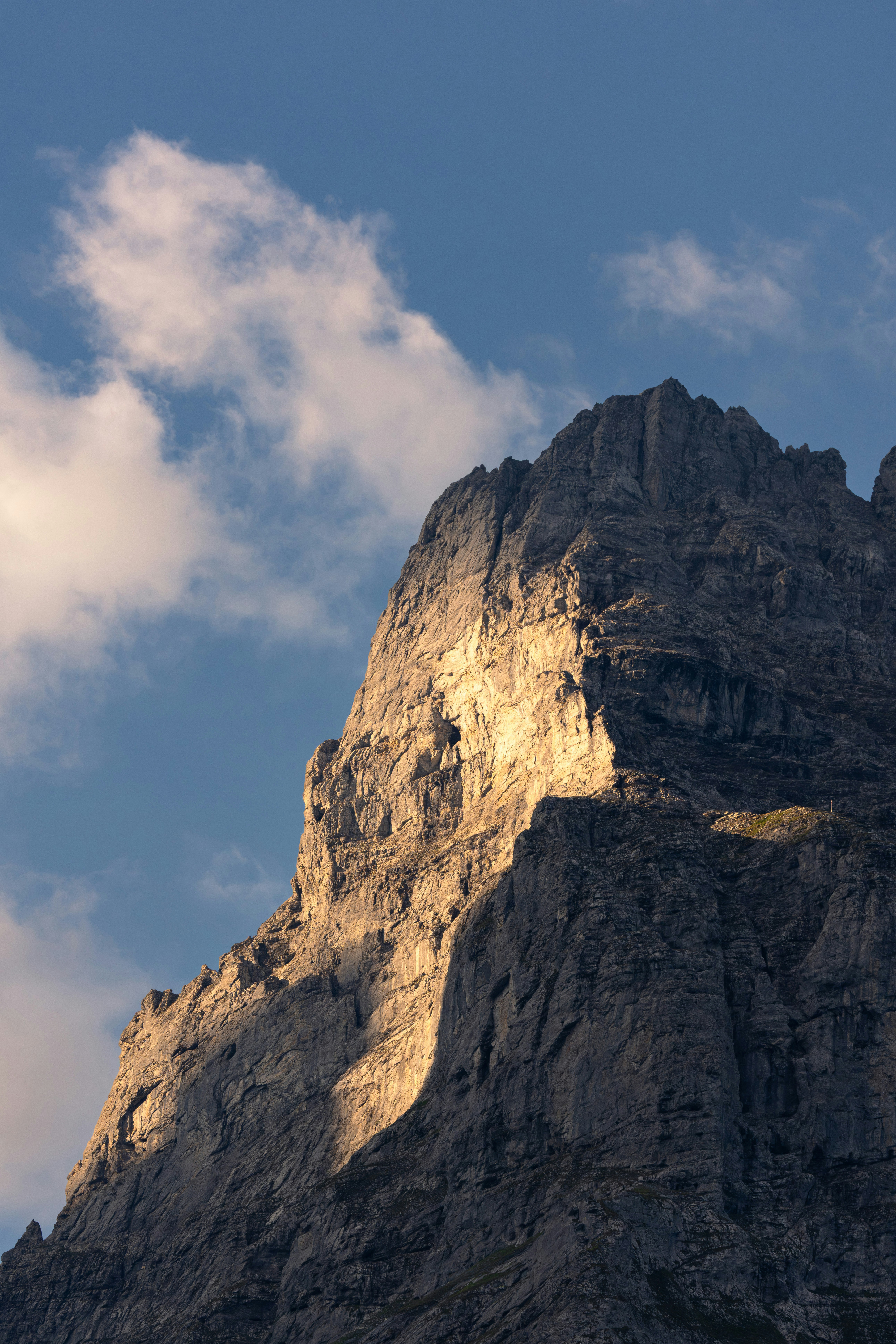 Sunlit Summit: The Golden Facade Reaching for the Sky