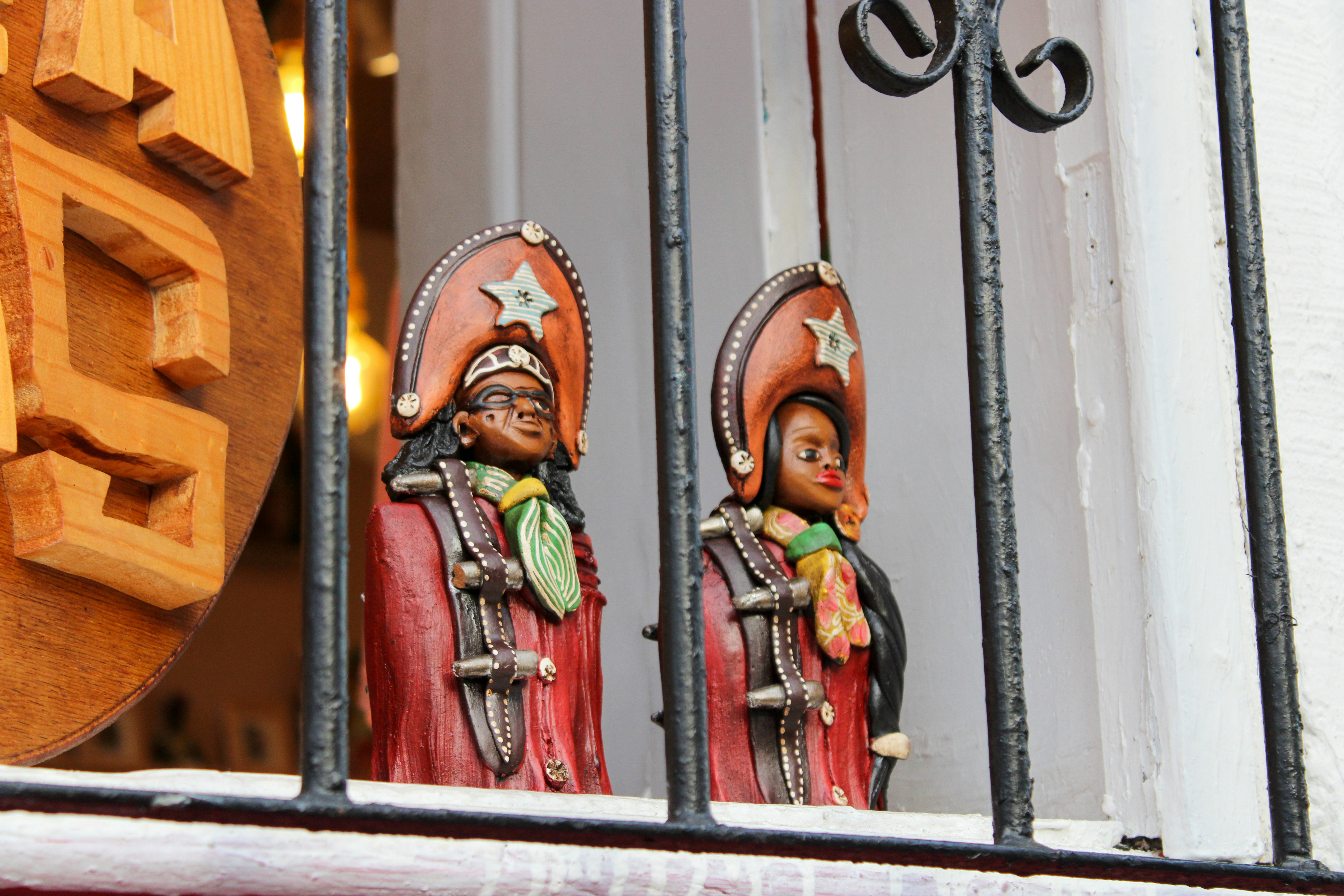Cherished Nutcracker Figures Guard a Windowed Porch