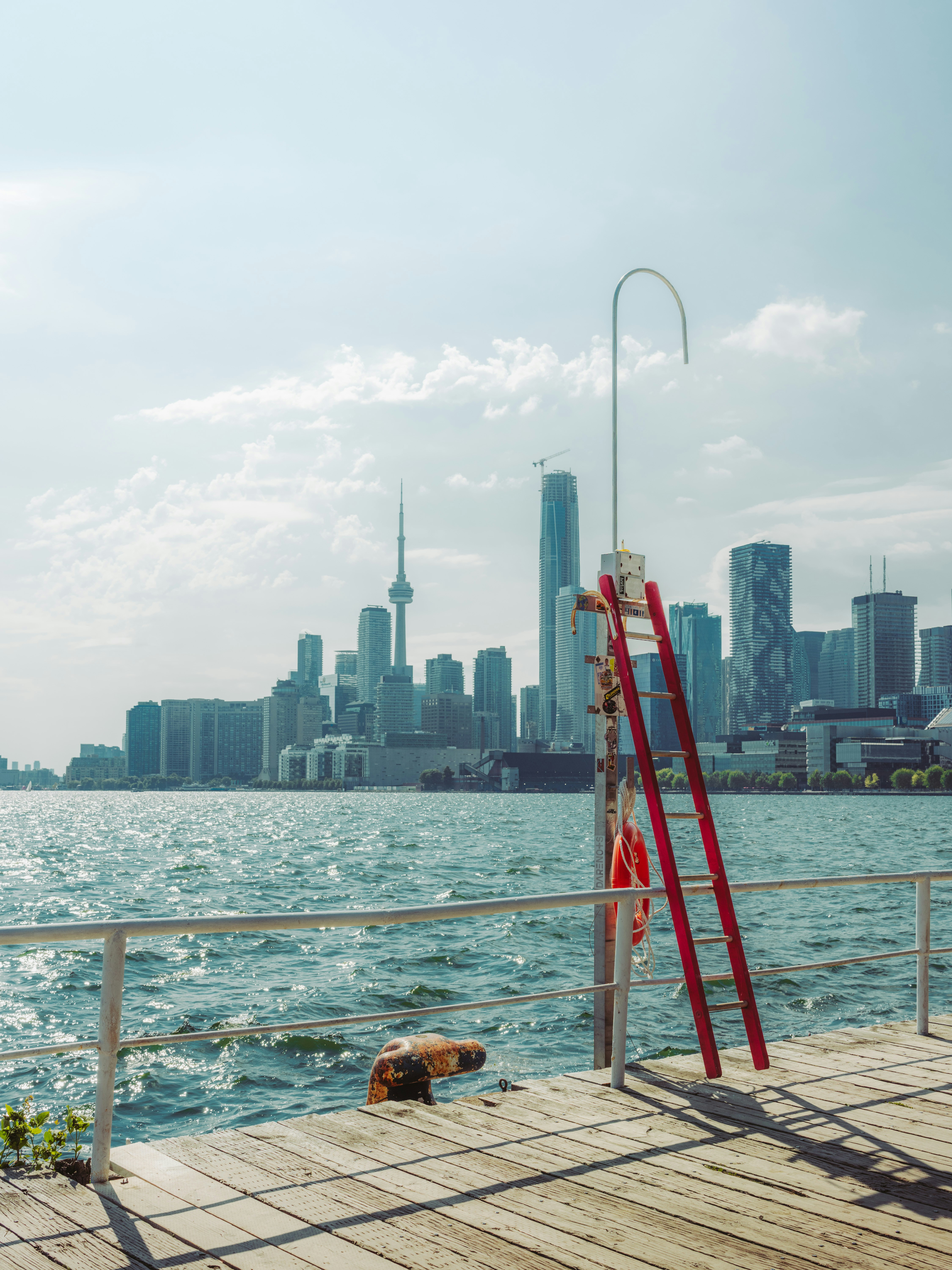 Ladder of Red by the Harbor: City Backdrop at Dusk