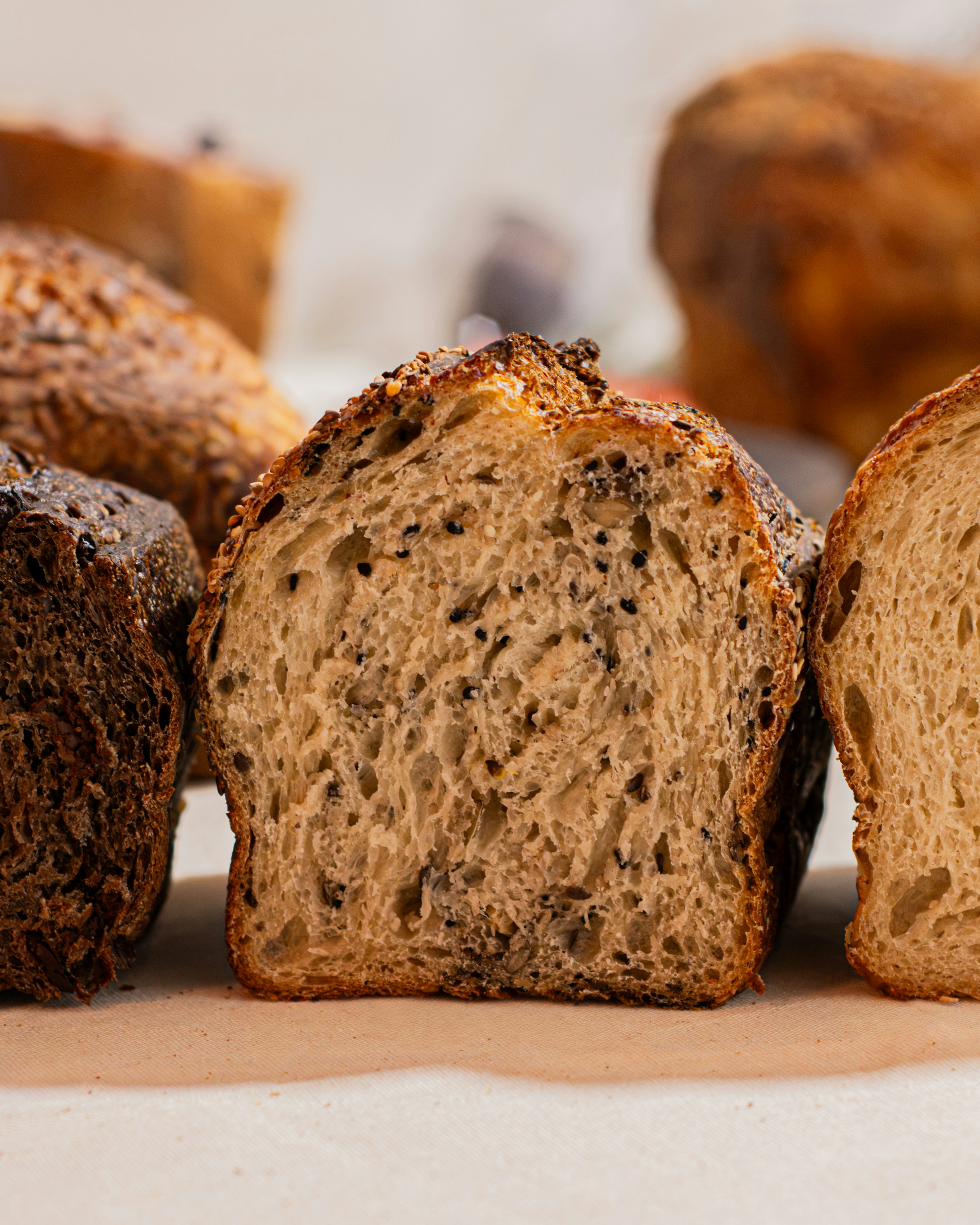 Center Slice: A Close-Up of Sliced Loaf with Seeded Crusts