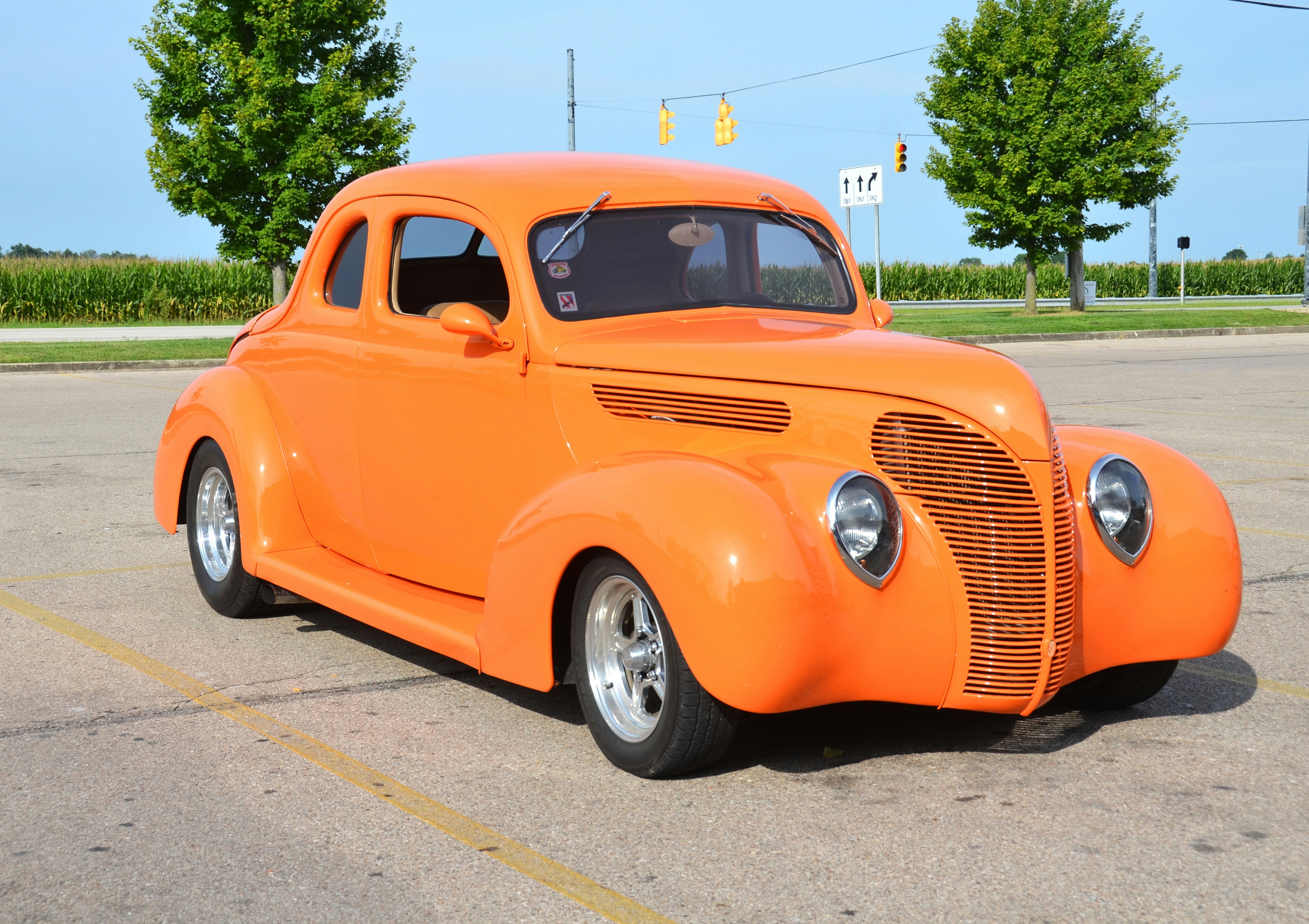 Orange Vintage Sedan: A Smooth Glide of Rust-Free Curves