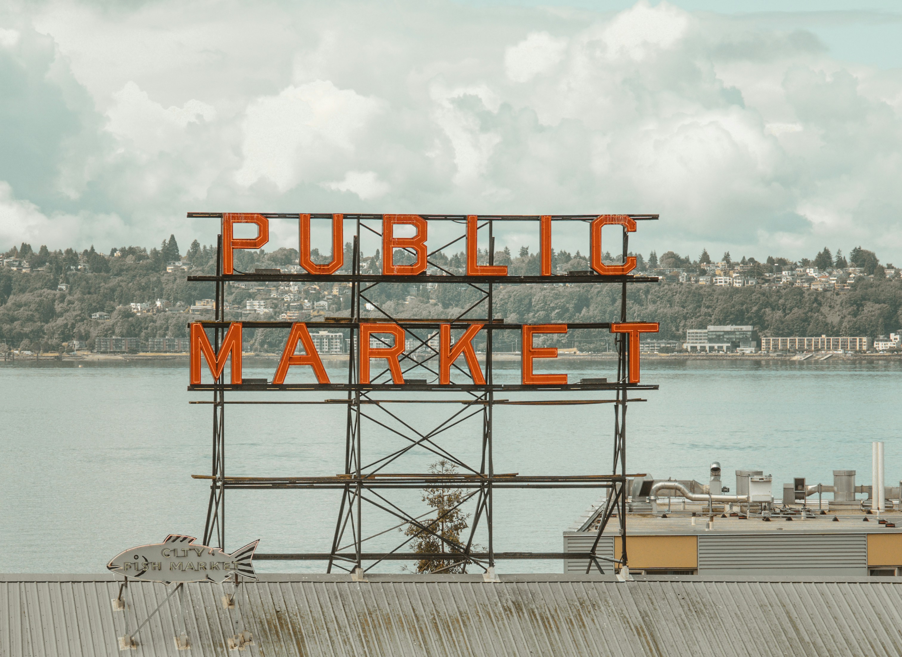 Neon Sign Overlooking the Waterfront Market