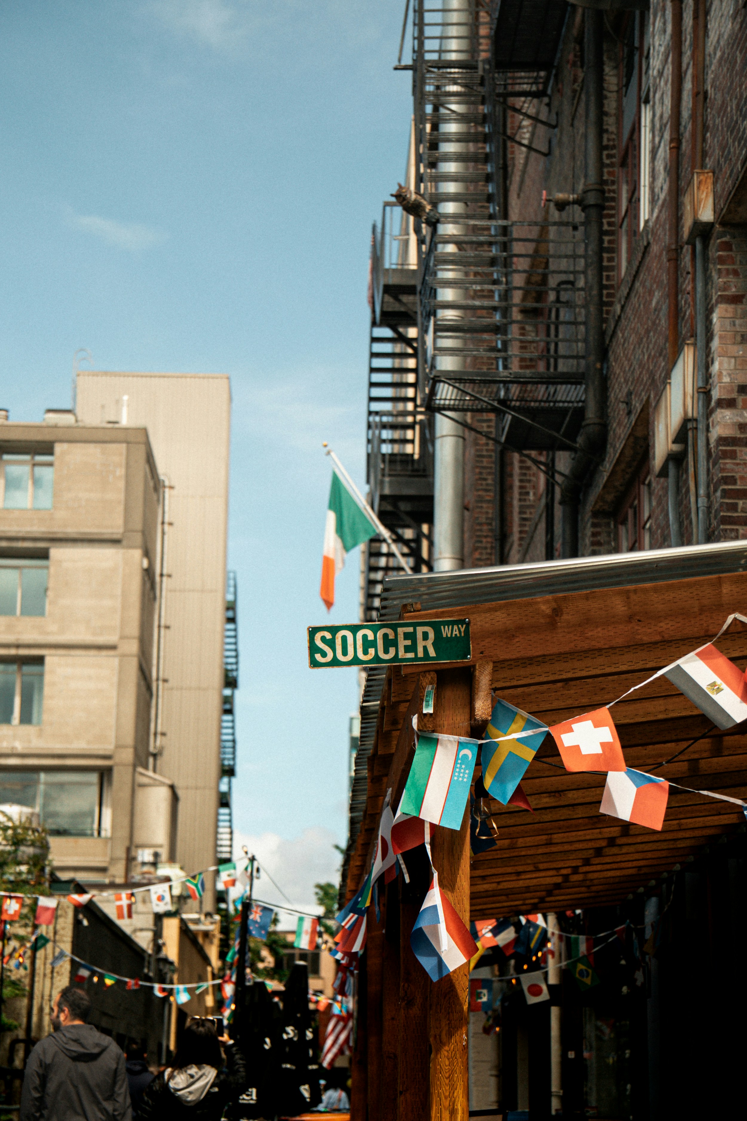 Flag-filled Alley: A City Street Celebrates Soccer