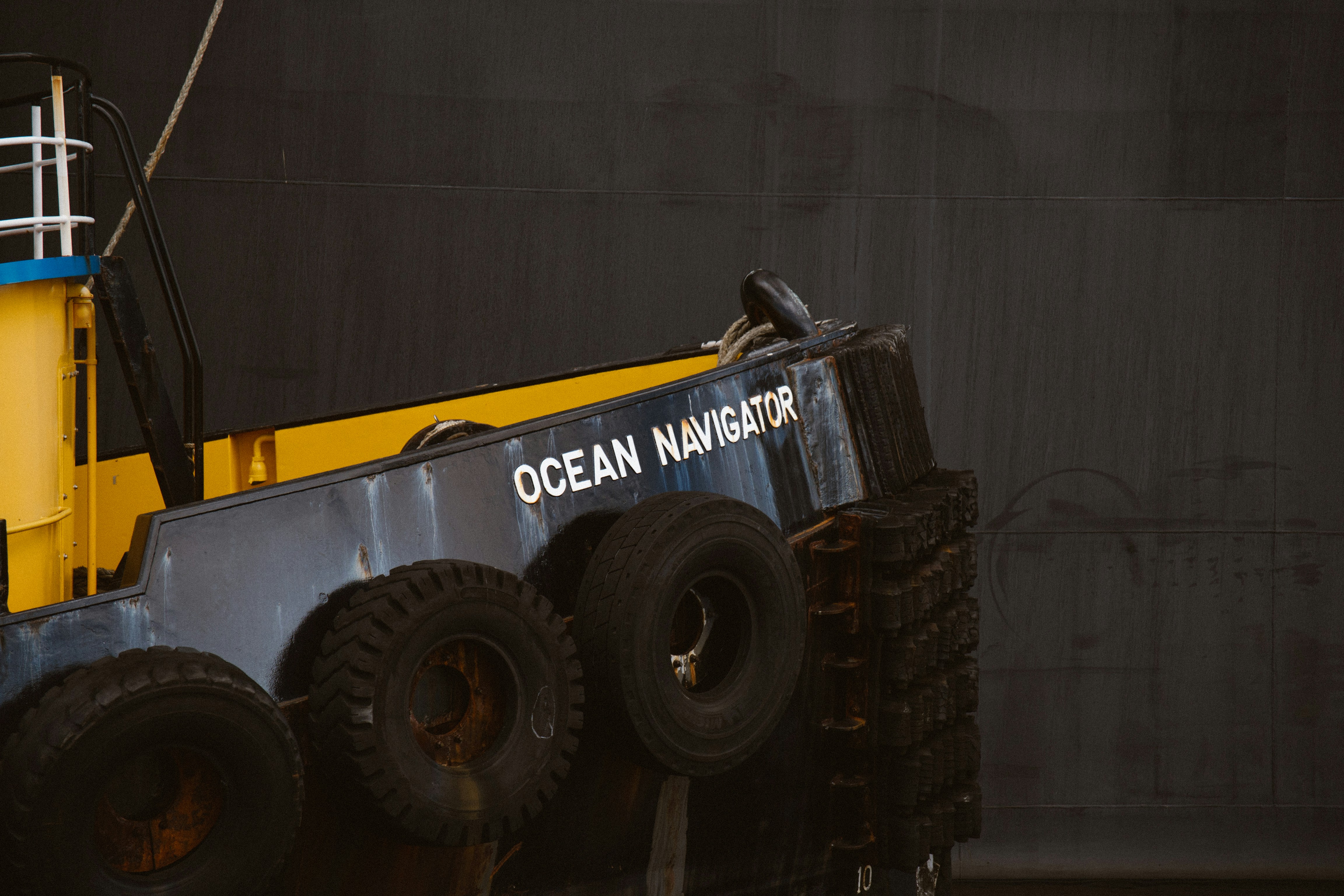 Ocean Navigator: A Heavy Tug Teeters on a Dockside Slope
