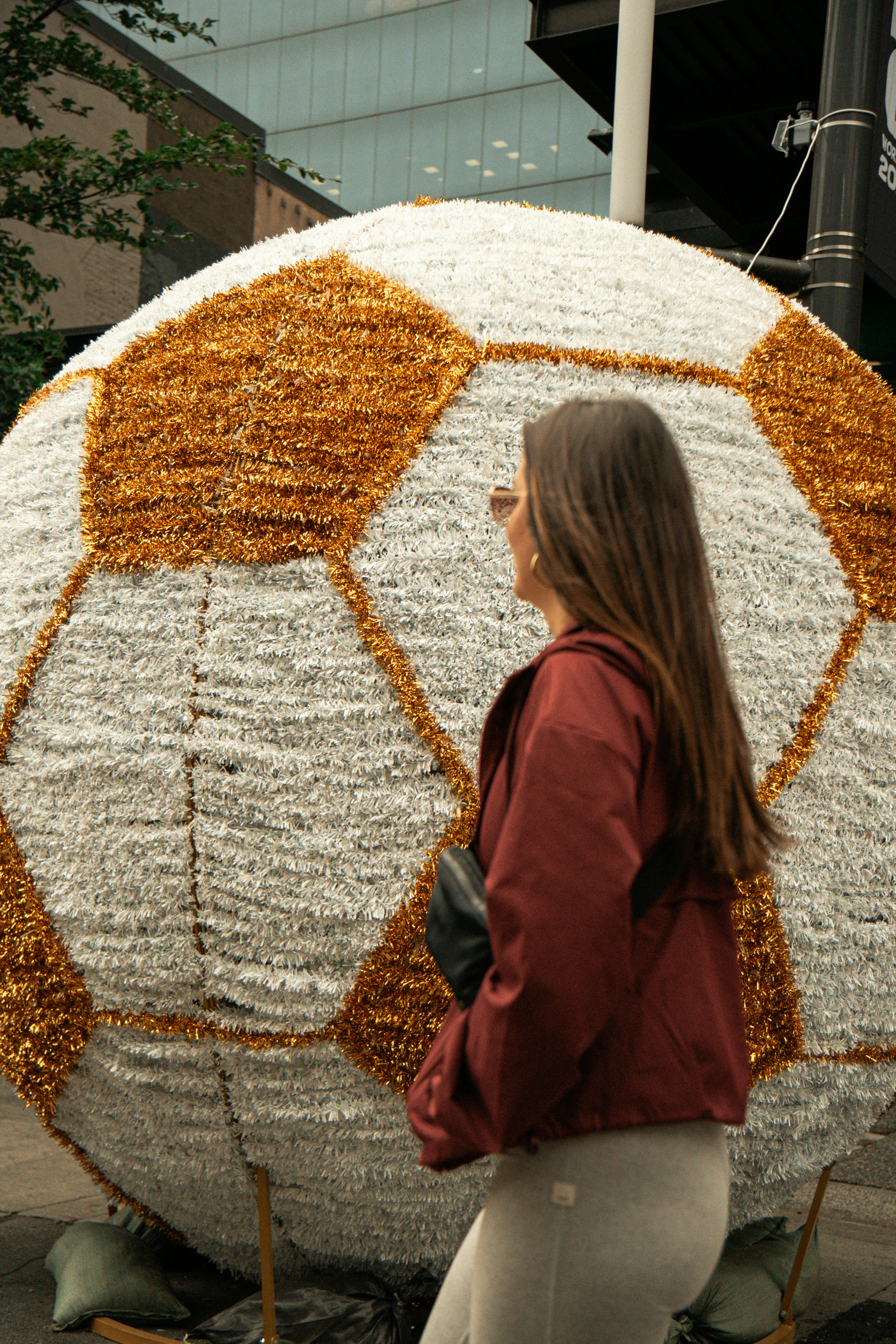 City Visitor with a Glittering Geometric Ball