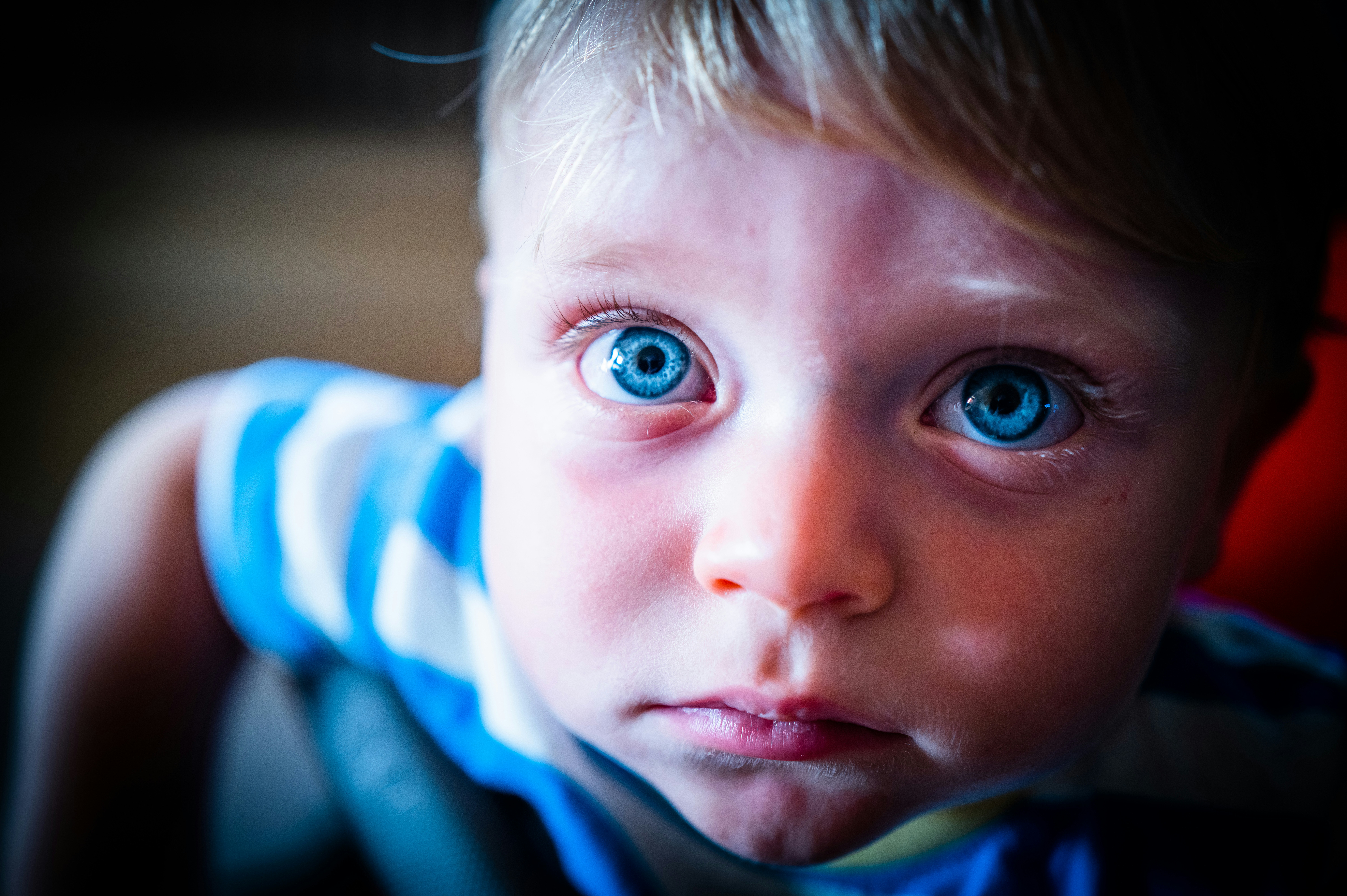 Azure Gaze: Close-Up of a Child's Expressive Blue Eyes