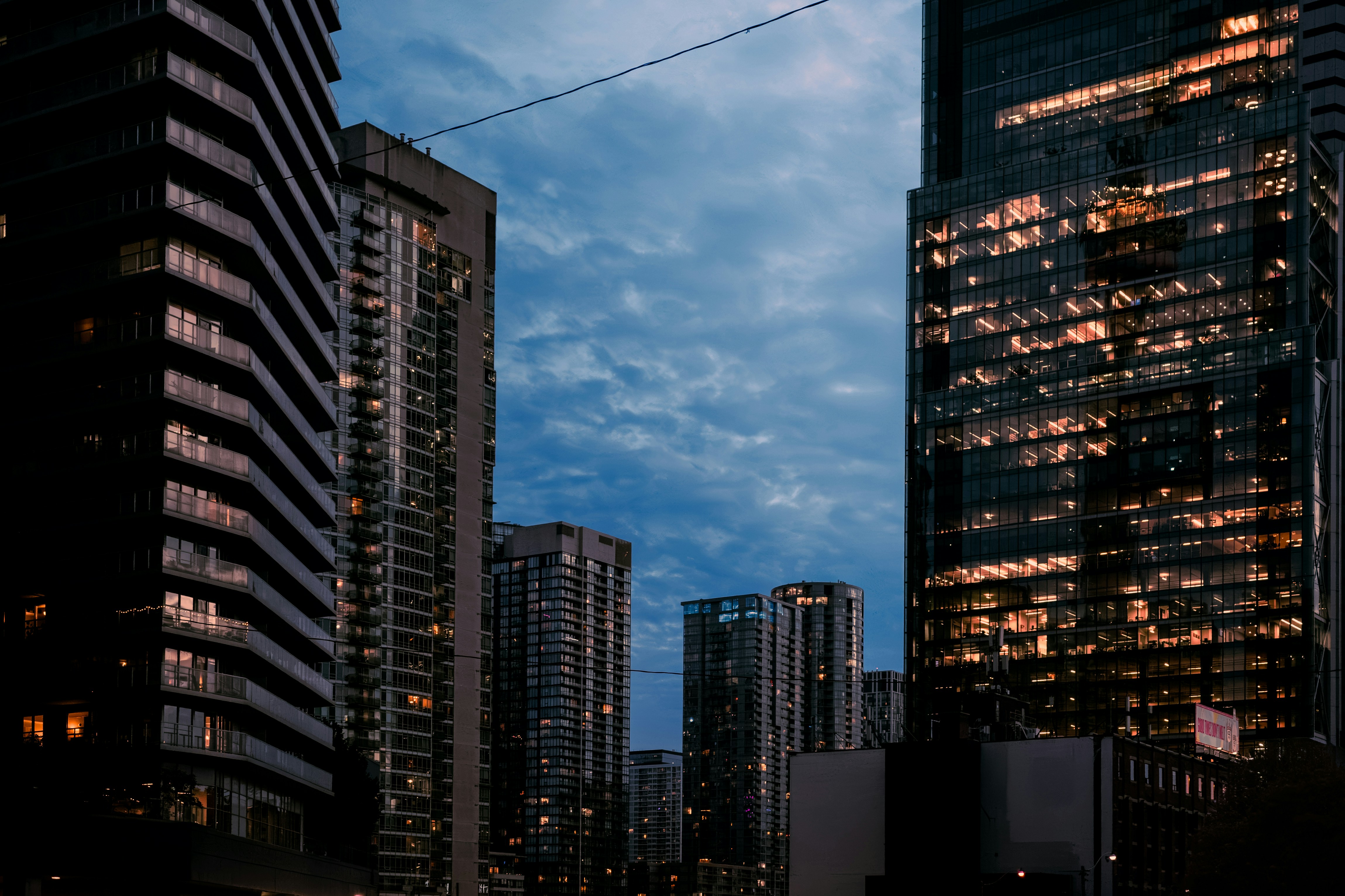 Urban Nightfall: Glass and Sky Between Towers