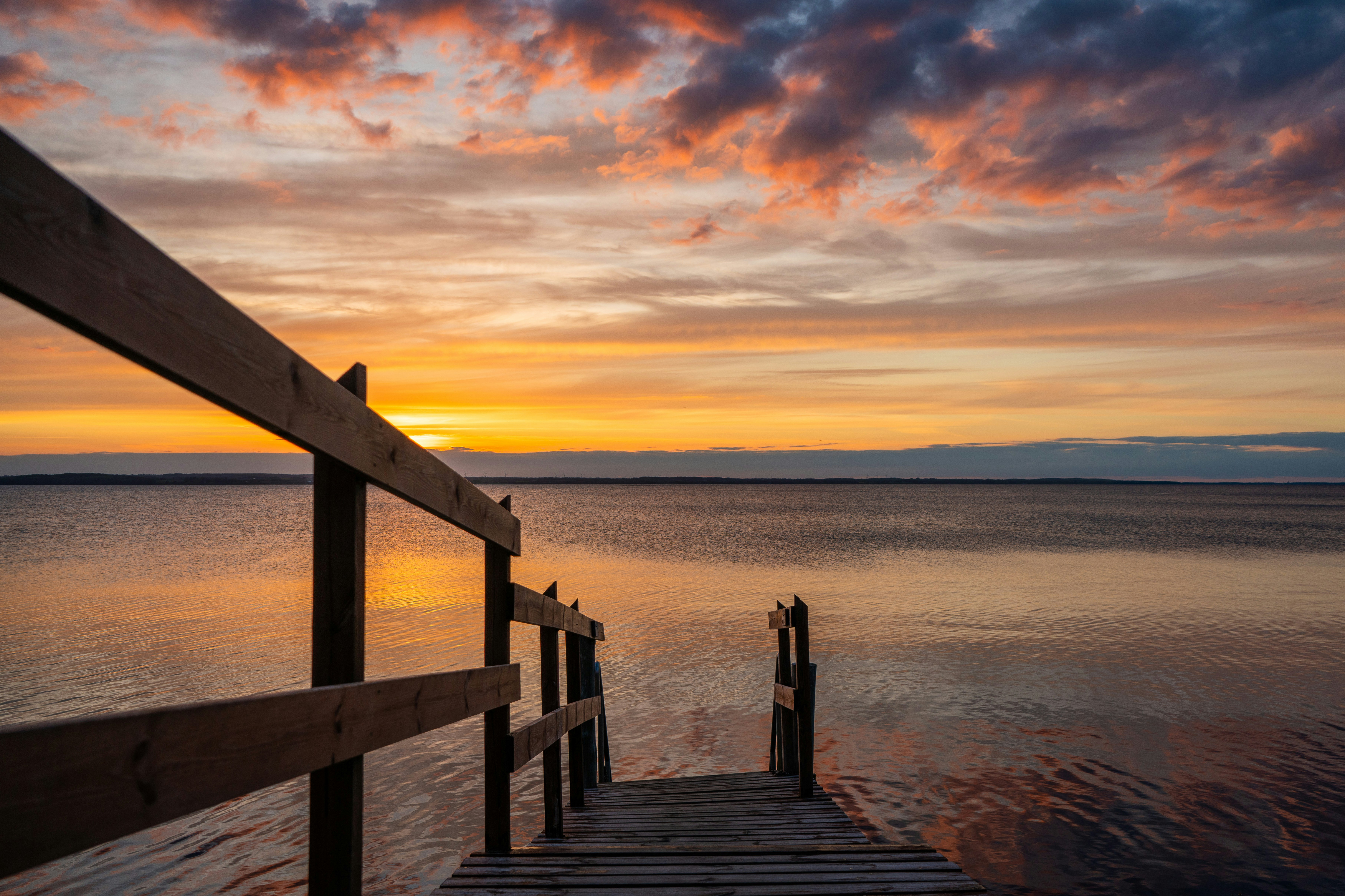 Sunset Pier: Leading Lines into Hollow Horizons