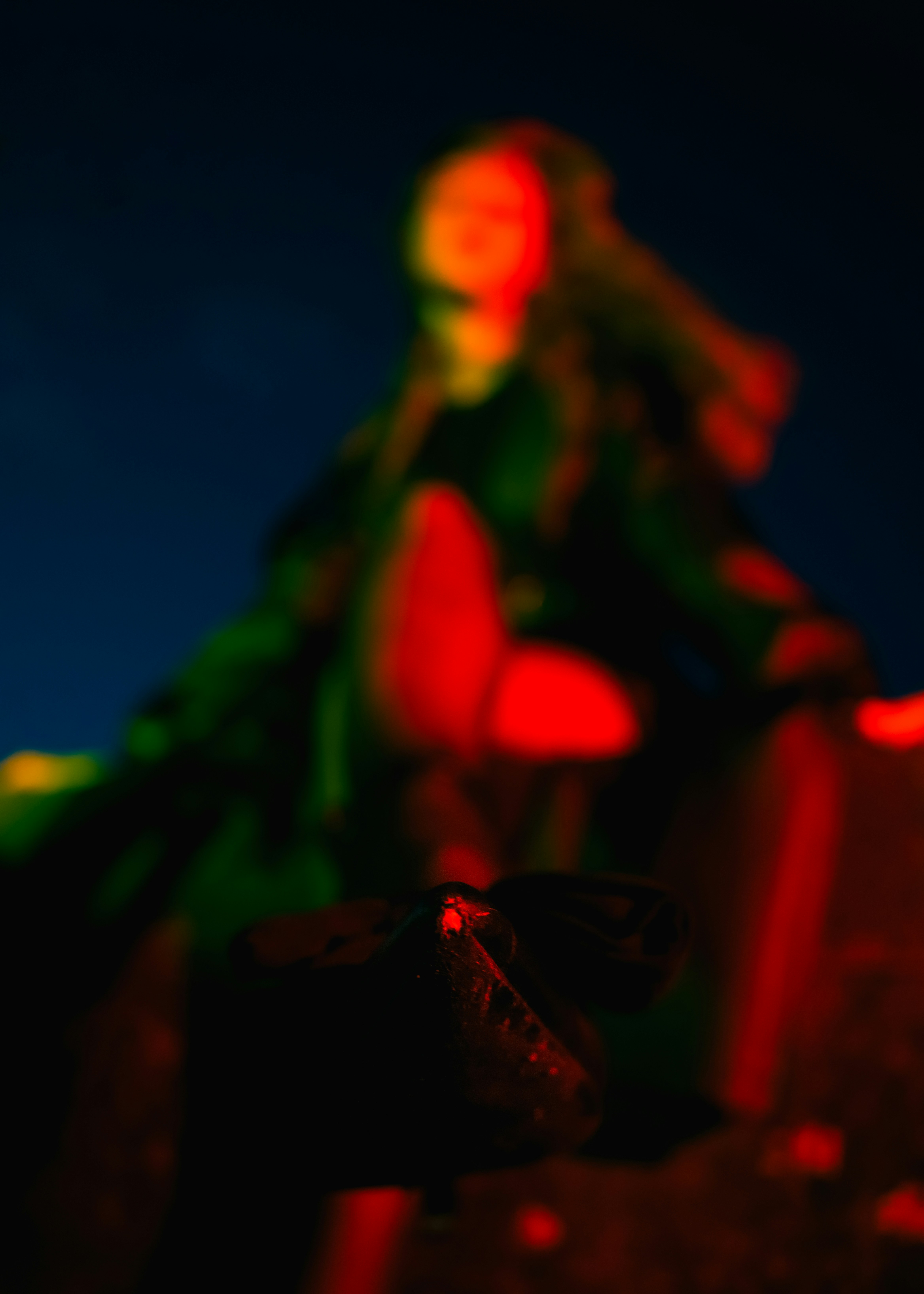 Blurred Spotlight: A Nighttime Stage Bloom