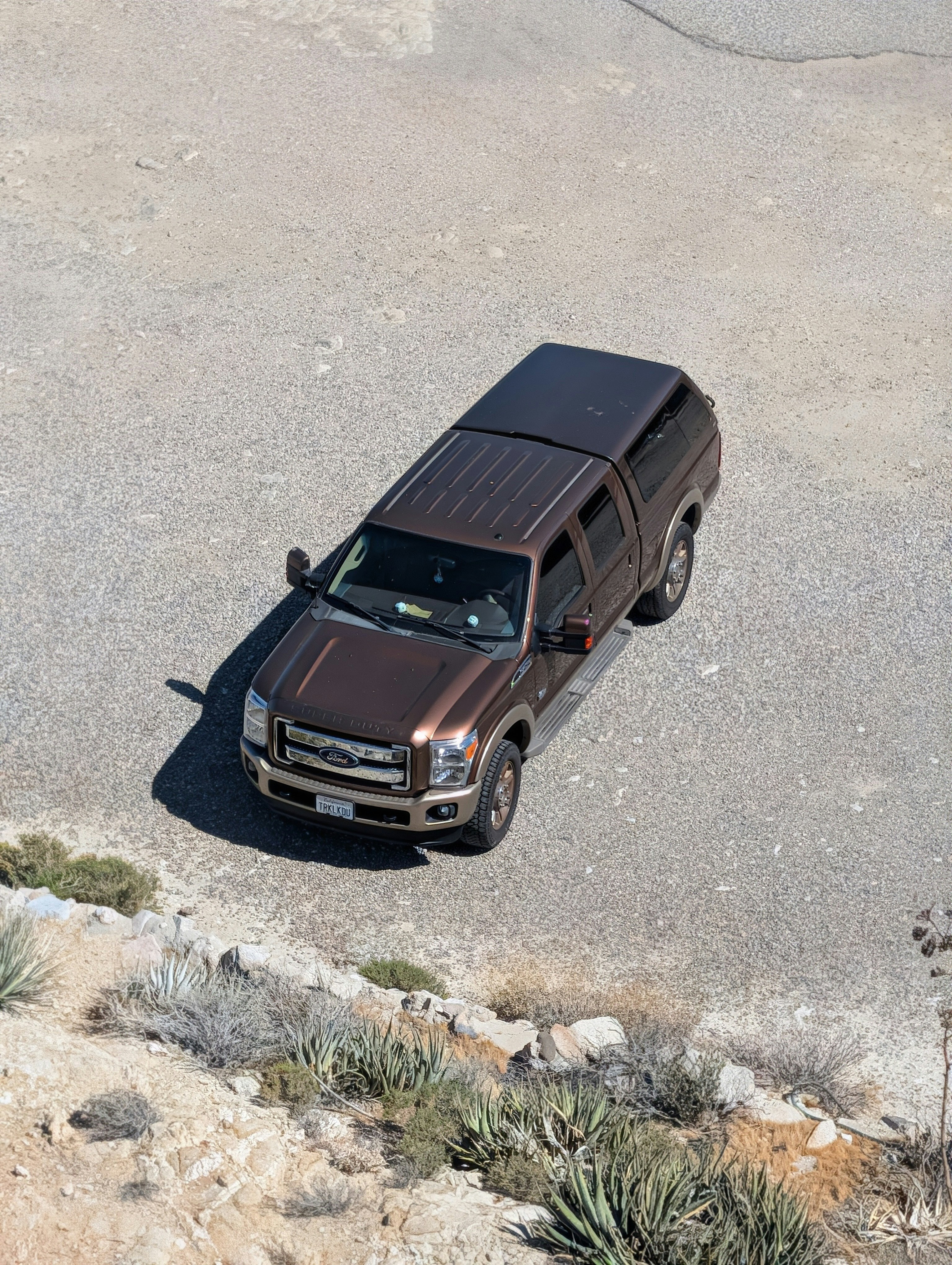 Abron Brown Pickup in Desert Gravel from Overhead Gaze