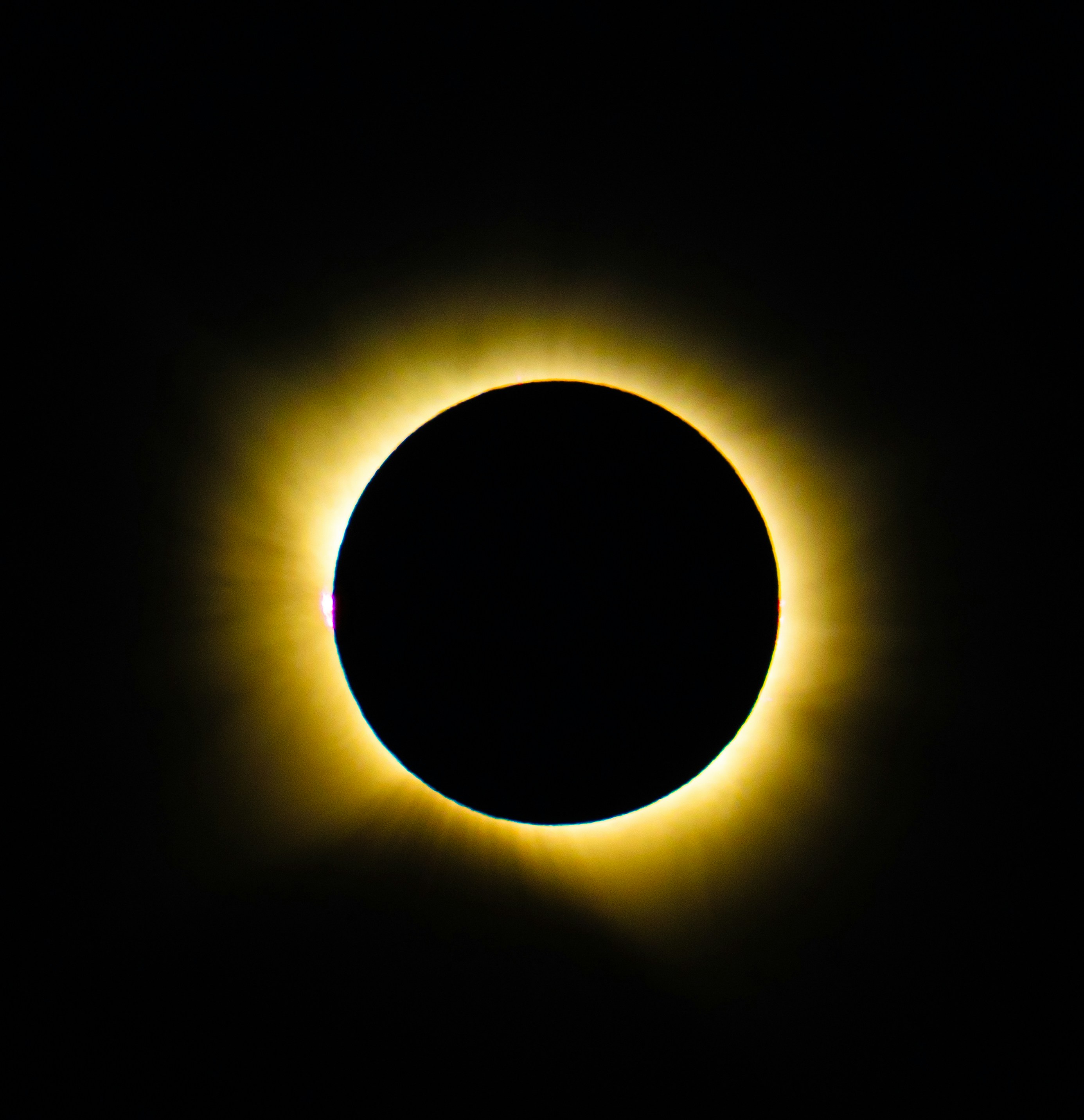 Solar Eclipse Halo: The Dark Circle with Golden Crown
