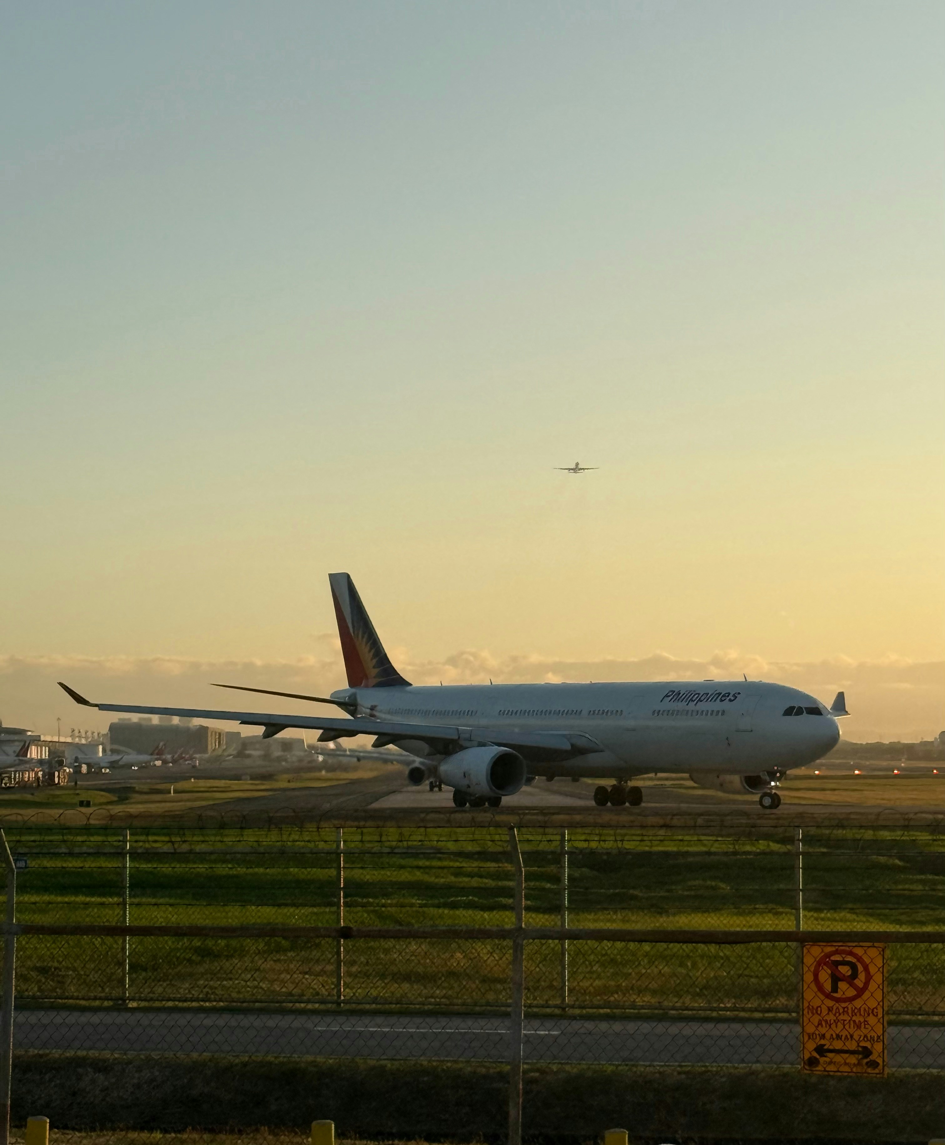 Sunlit Freighter at Gate: A Quiet Moment on the Tarmac