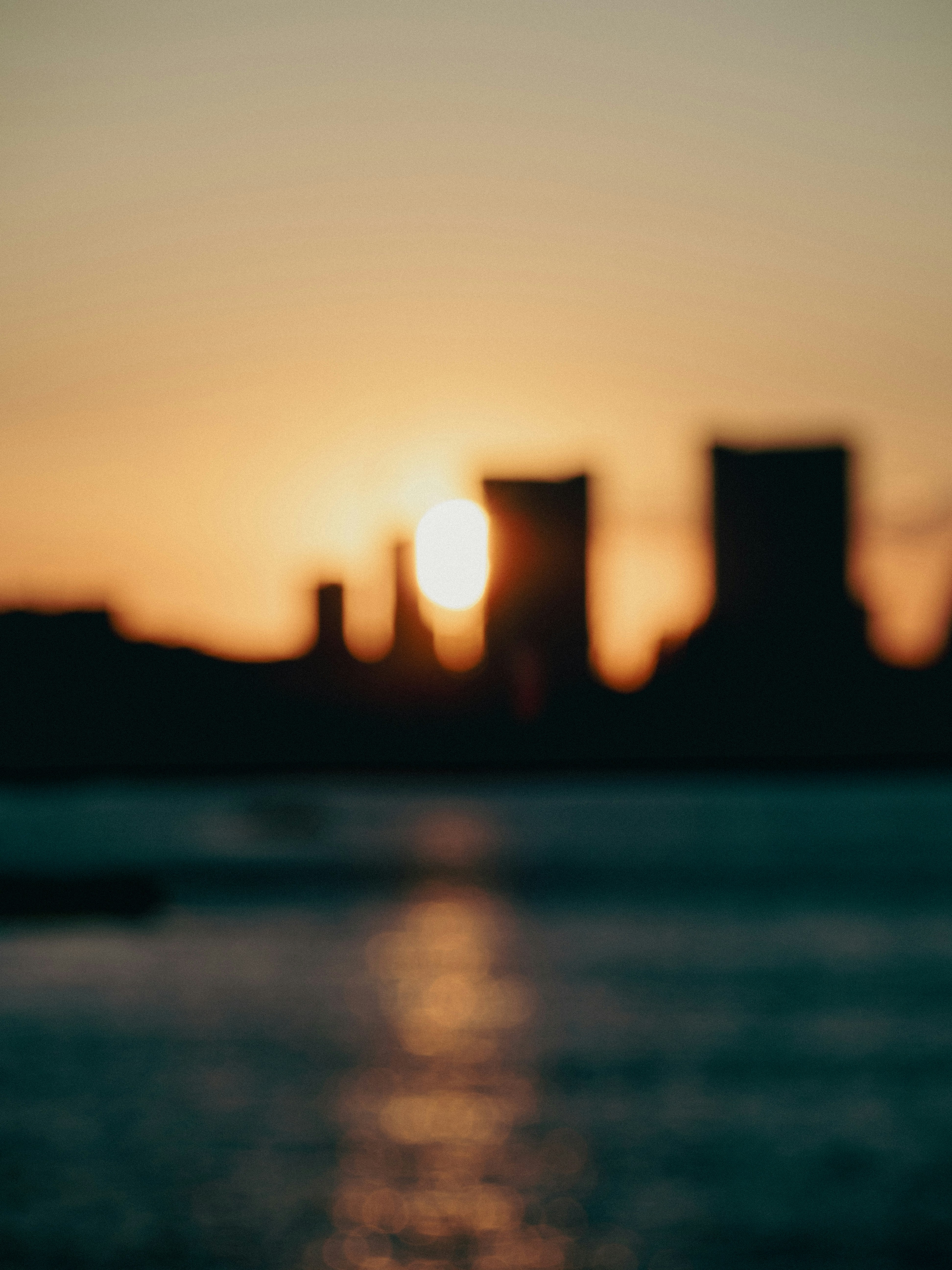 Sunset Silhouette Over Quiet Water