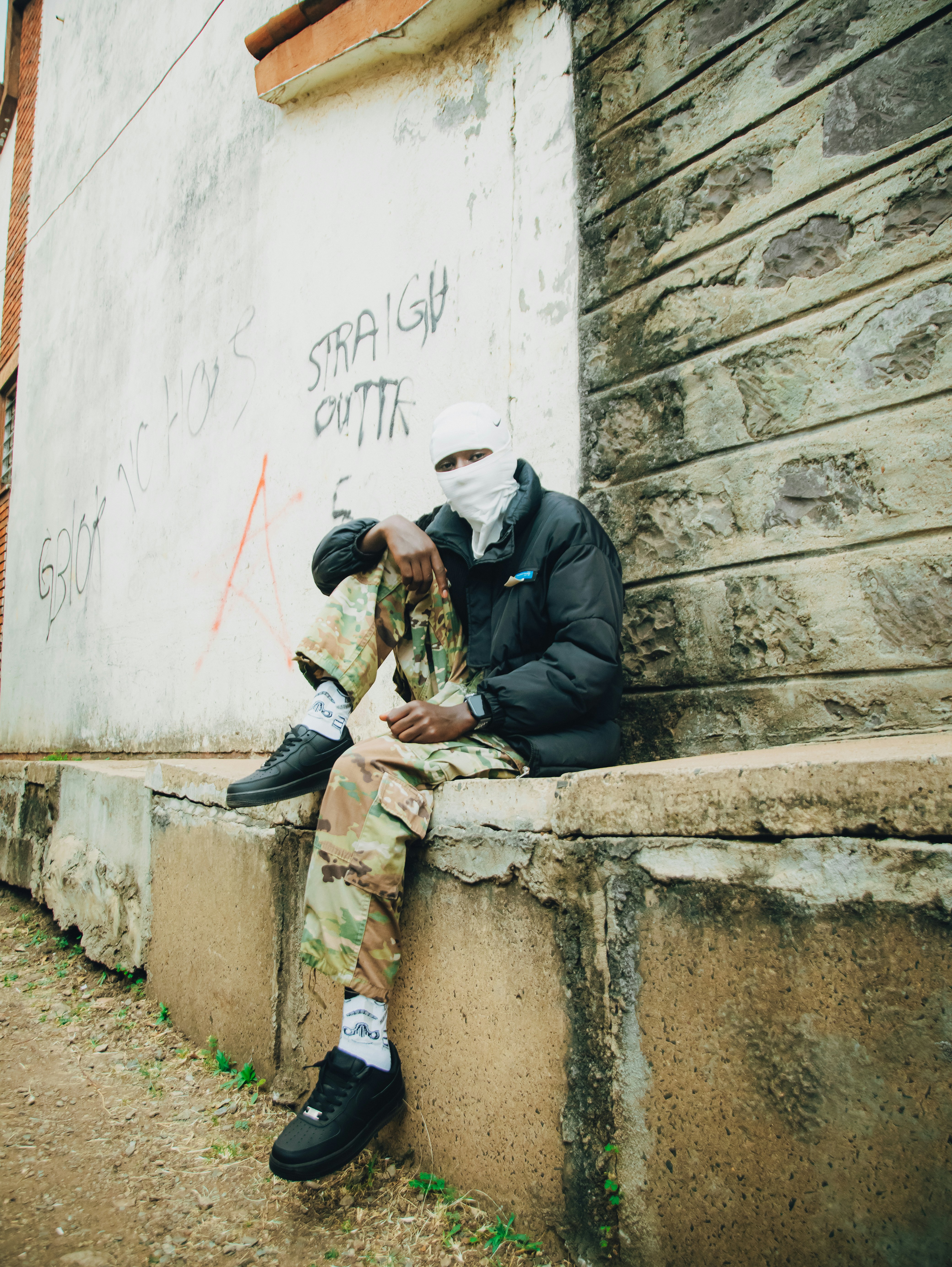 Urban Silence: A Gaze Between Concrete and Camouflage