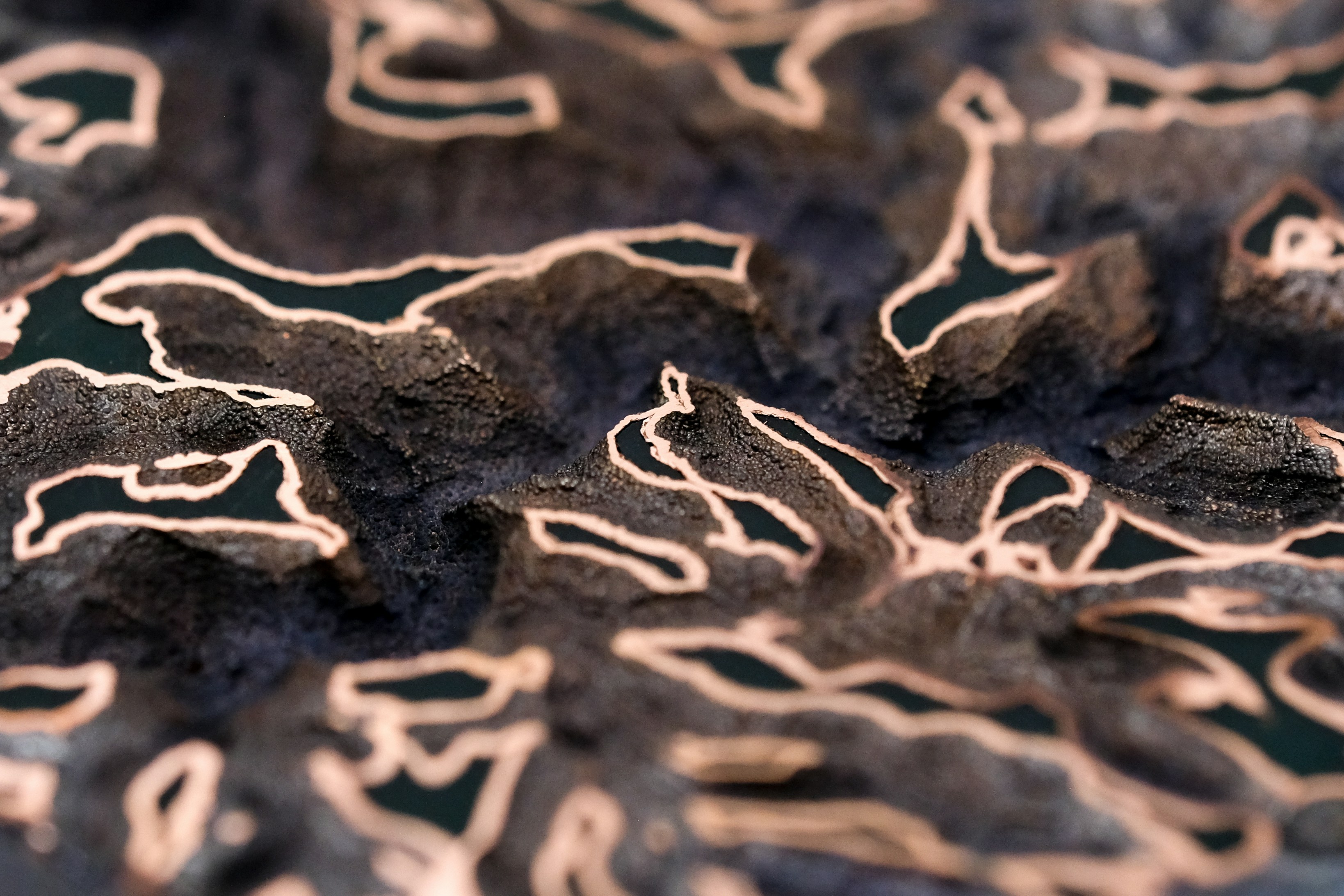 Luminous Lattice: Glowing Patterns on Volcanic Rock