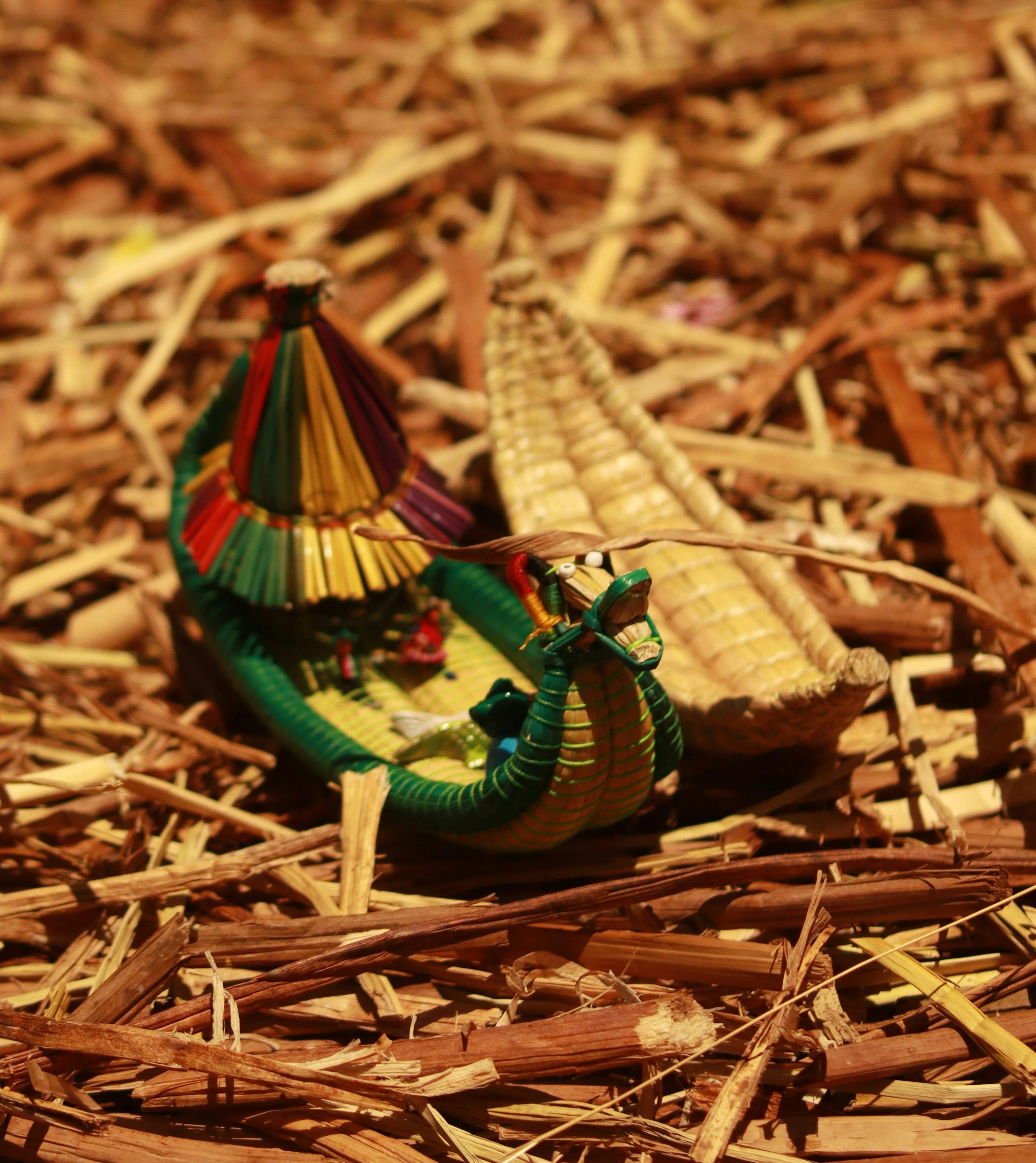Miniature Dragon Boat on a Bed of Straw