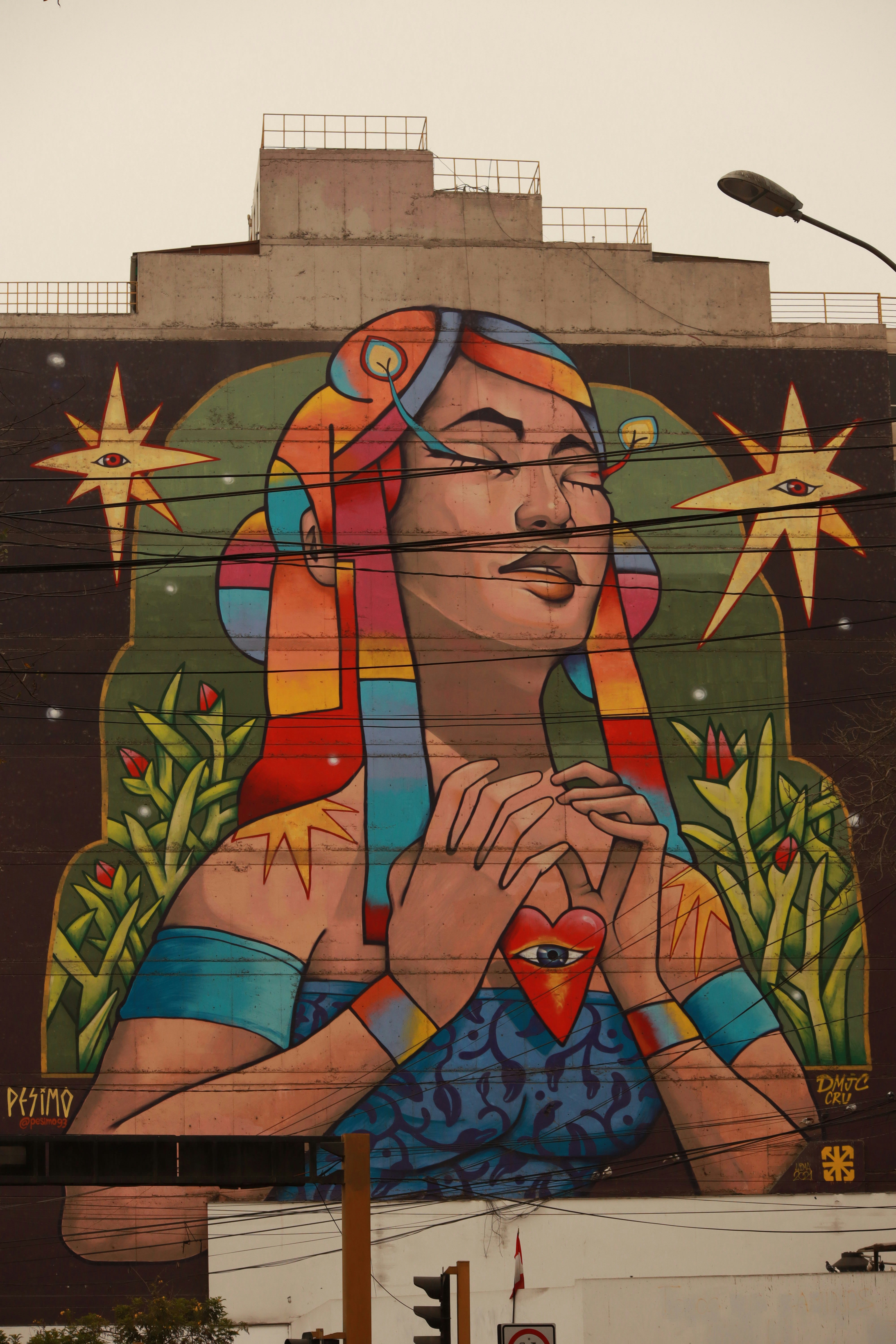 Prayerful Portrait: A Graffiti Madonna in Warm Sunset Hues