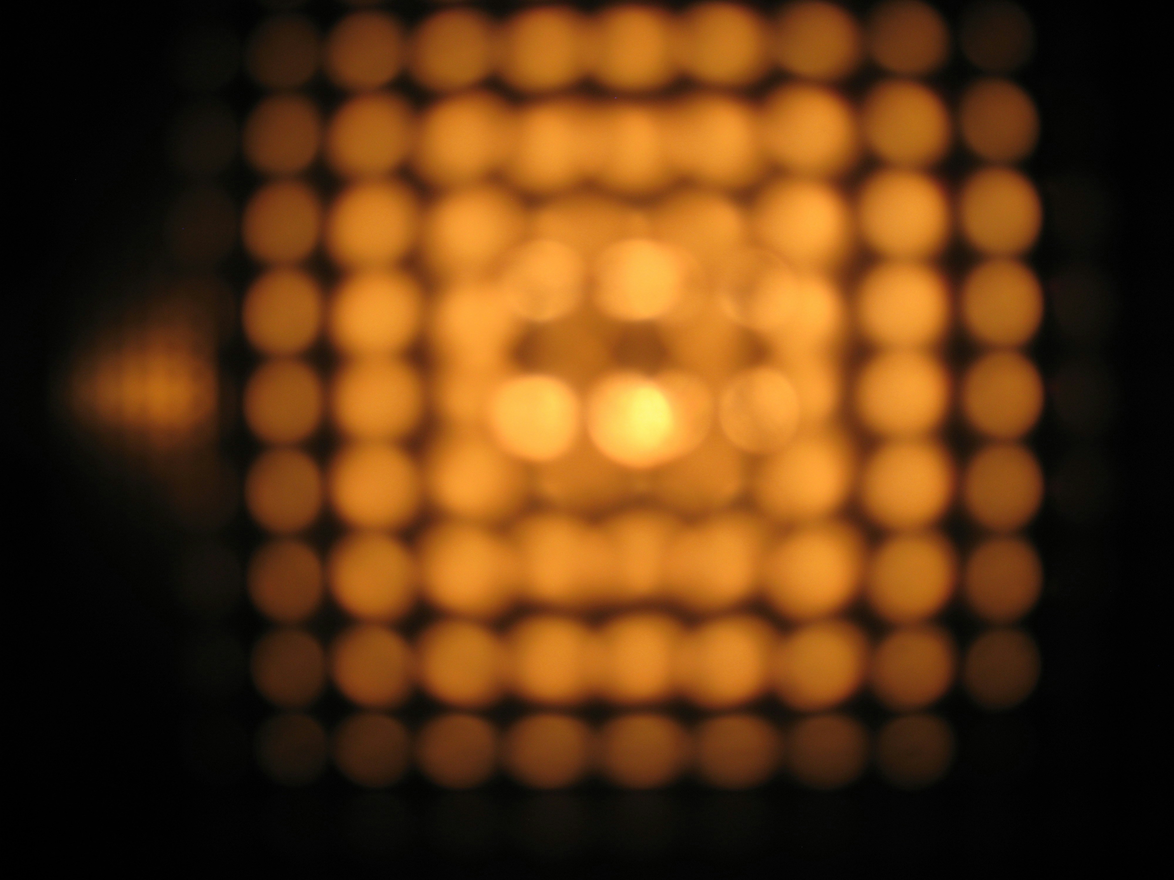 Golden Grid of Focus: Soft Bokeh Neon Squares